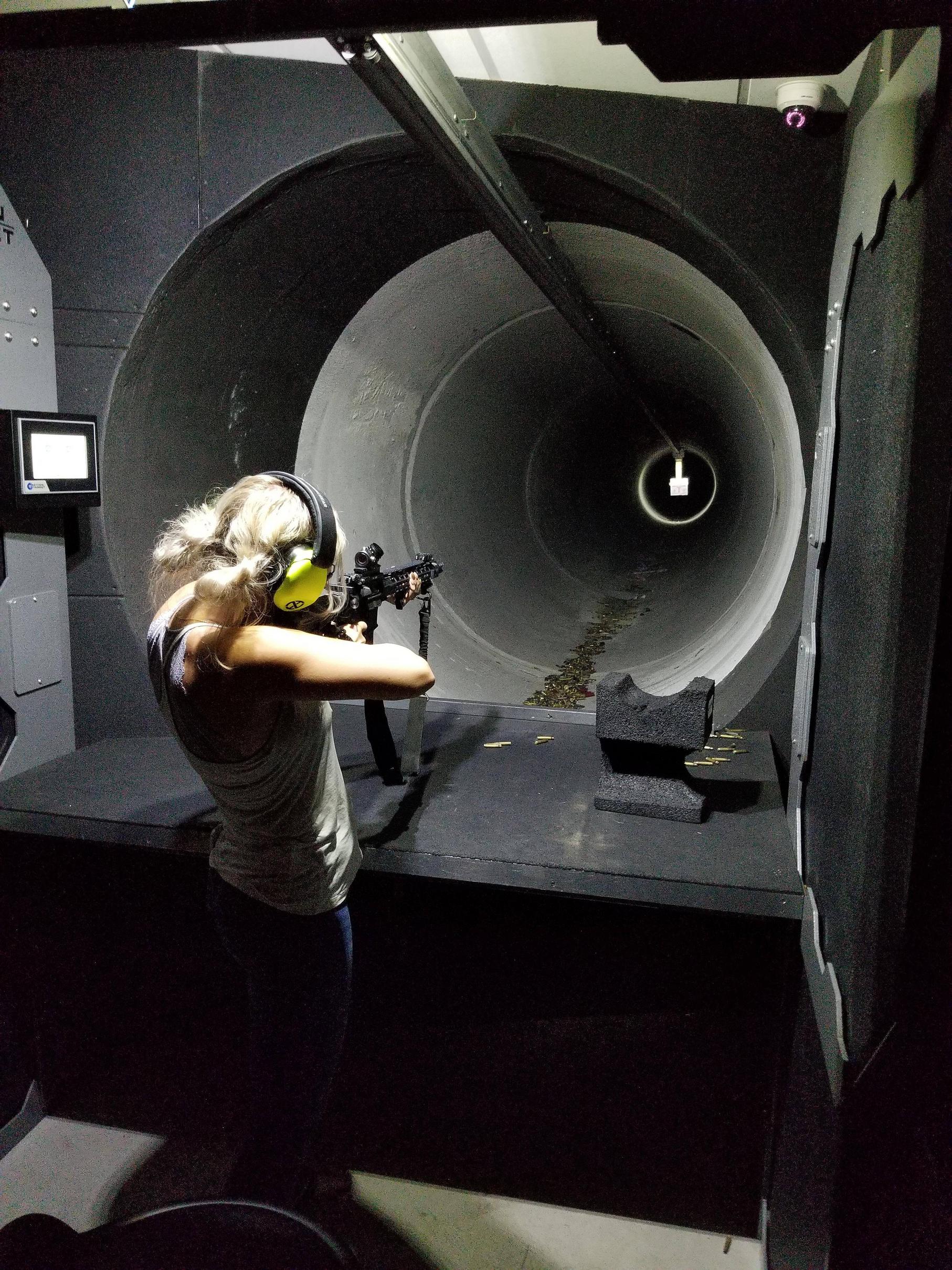 My wife shooting the AR-15 | Scrolller