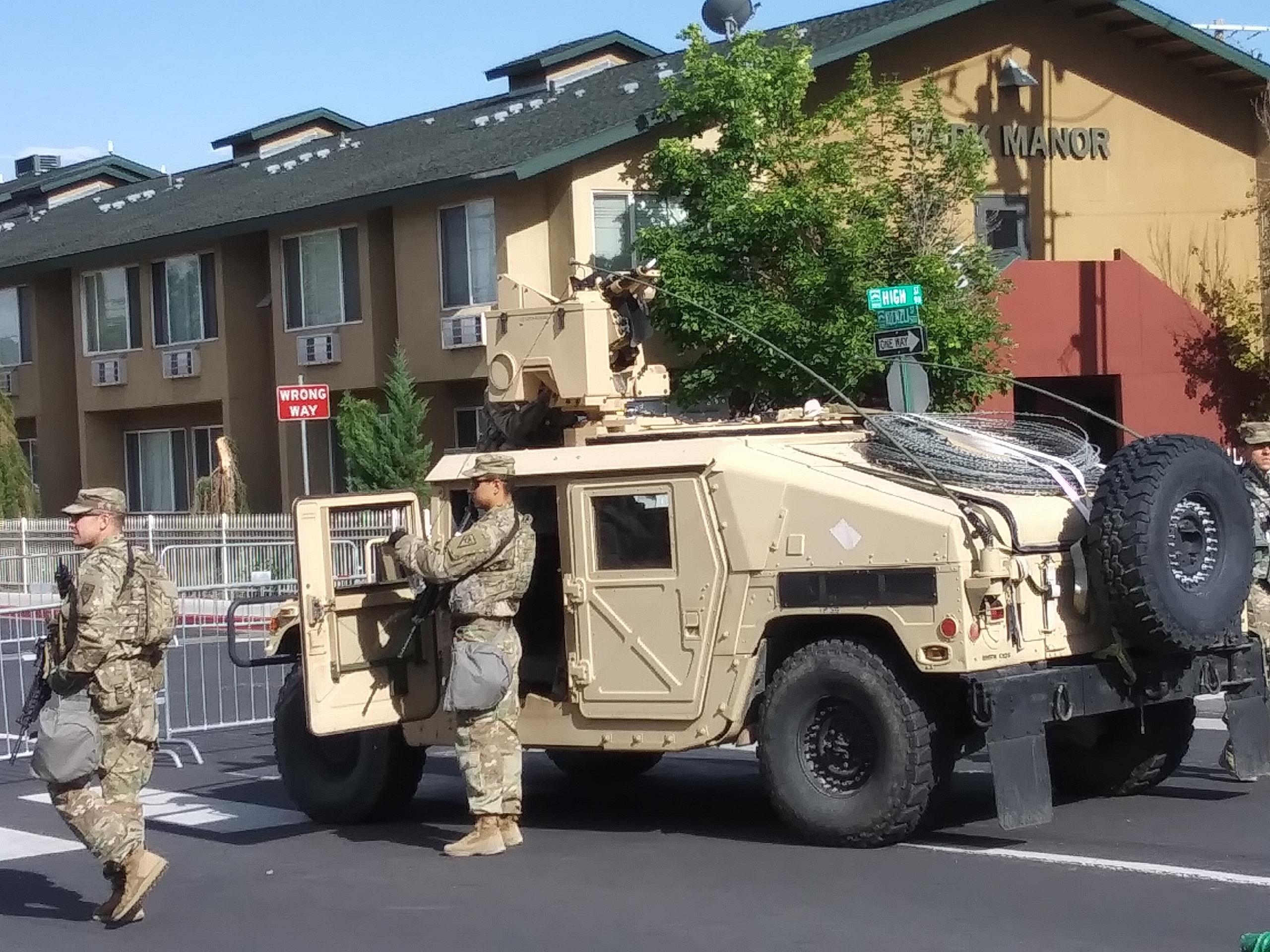 National Guard HMMWV behind the police station | Scrolller