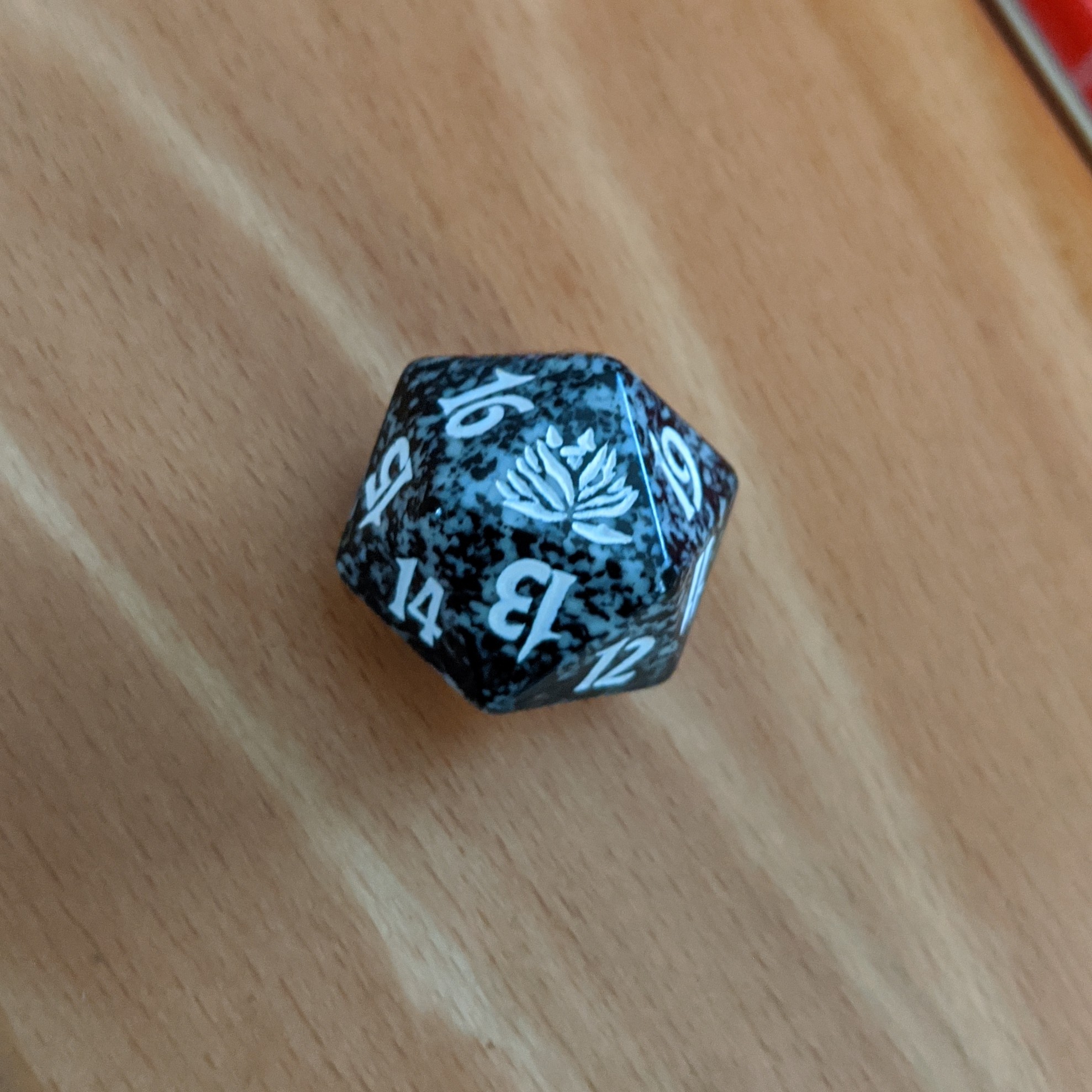 Need help identifying this d20 | Scrolller