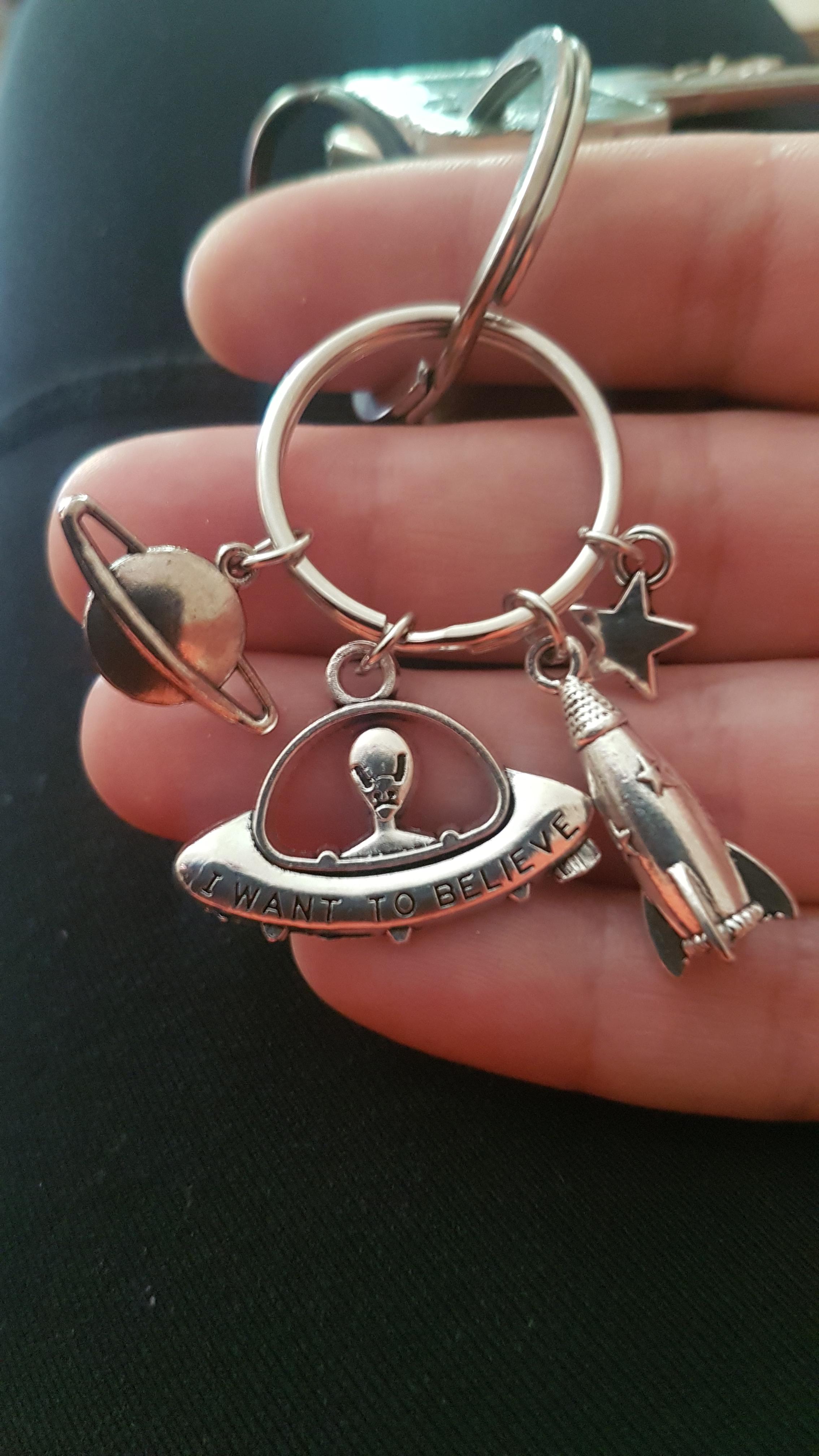 New keychain! The lil Reticulan looks a bit grumpy though ☺💖 | Scrolller