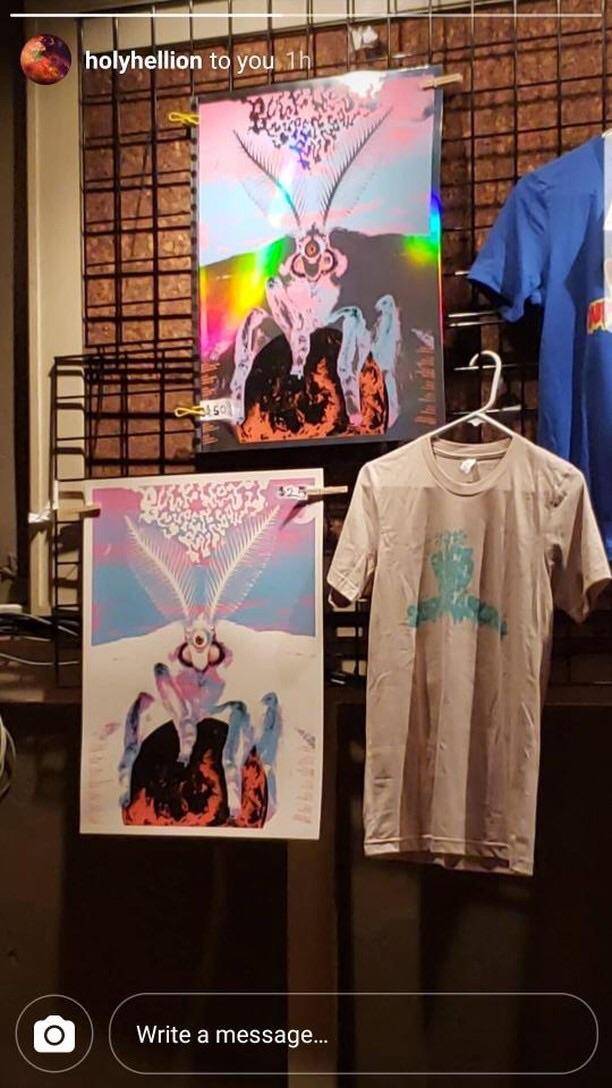 New posters at the merch table | Scrolller