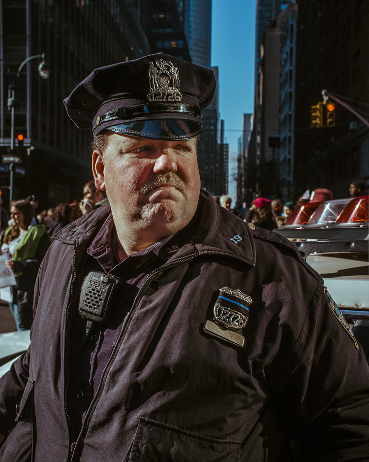 NYPD officer during the Women's March | Scrolller