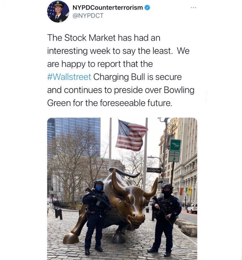 nypd officers protecting what's really important. the faded american flag really brings it all ...
