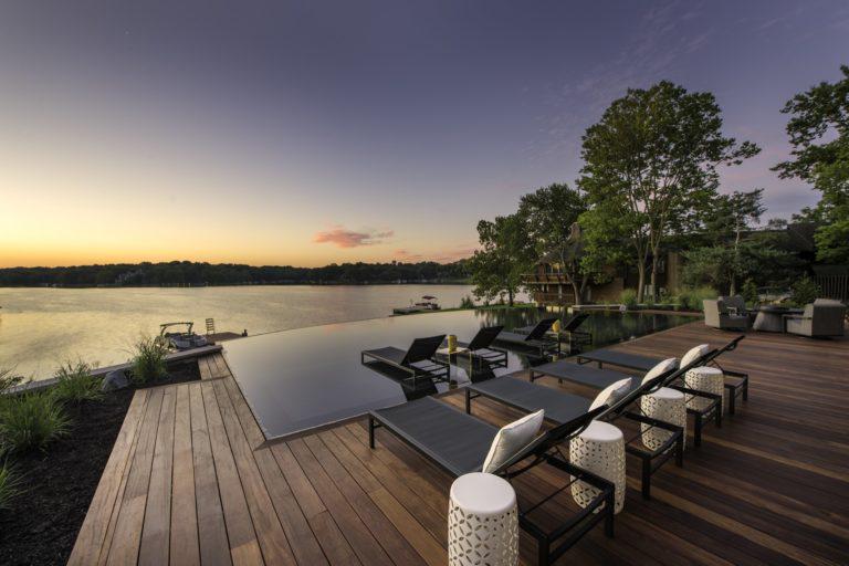 One of our pool designs...infinity edge, lake lot. | Scrolller