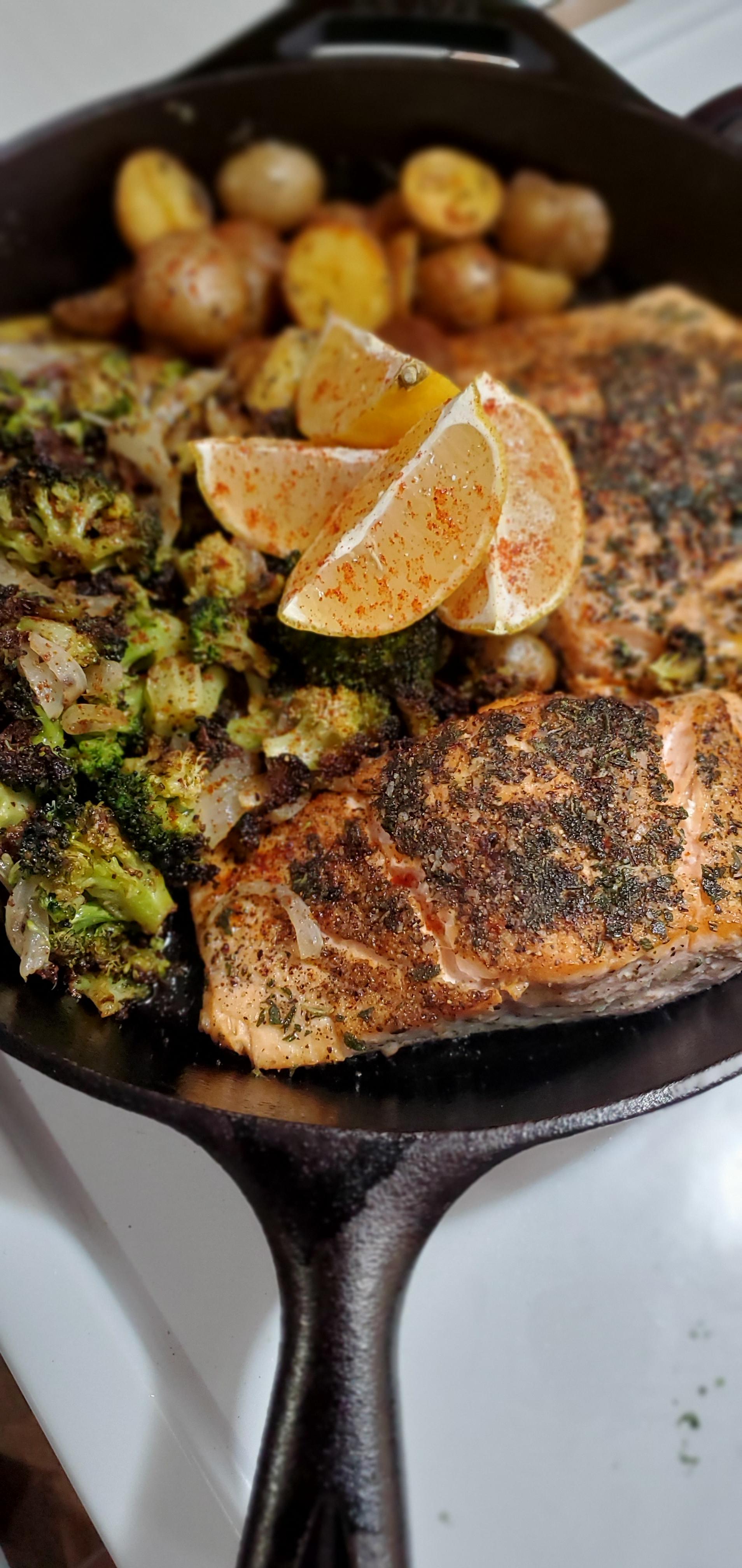 One pan herbed salmon, potatoes and broccoli. | Scrolller