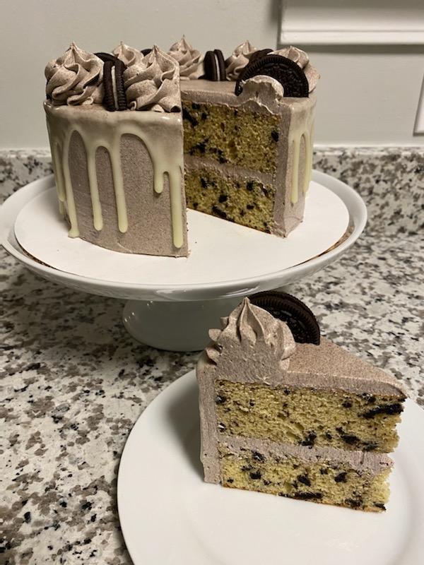 Oreo cake with Oreo frosting and a white chocolate ganache drip. | Scrolller
