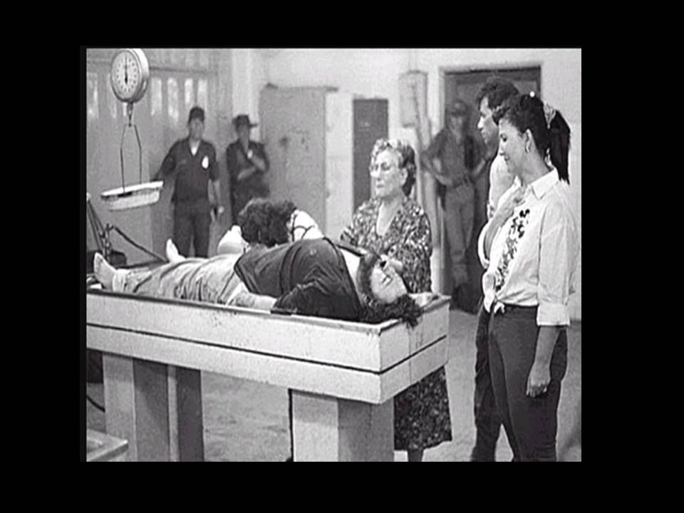 Pablo's mother identifying him in the Morgue. | Scrolller