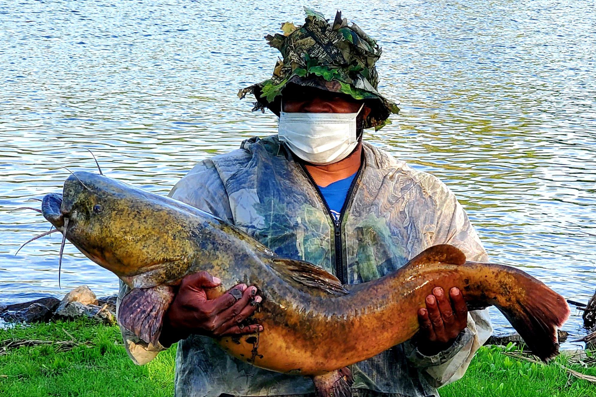 PB!! Flathead 42.5" 23lbs. HUGE catch! Took me 30 mins to PULL this guy in! Worth every minute ...