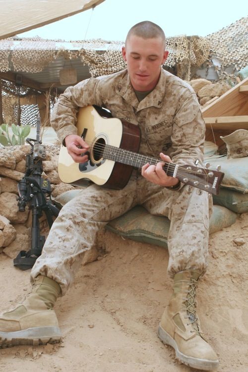 Playing guitar | Scrolller