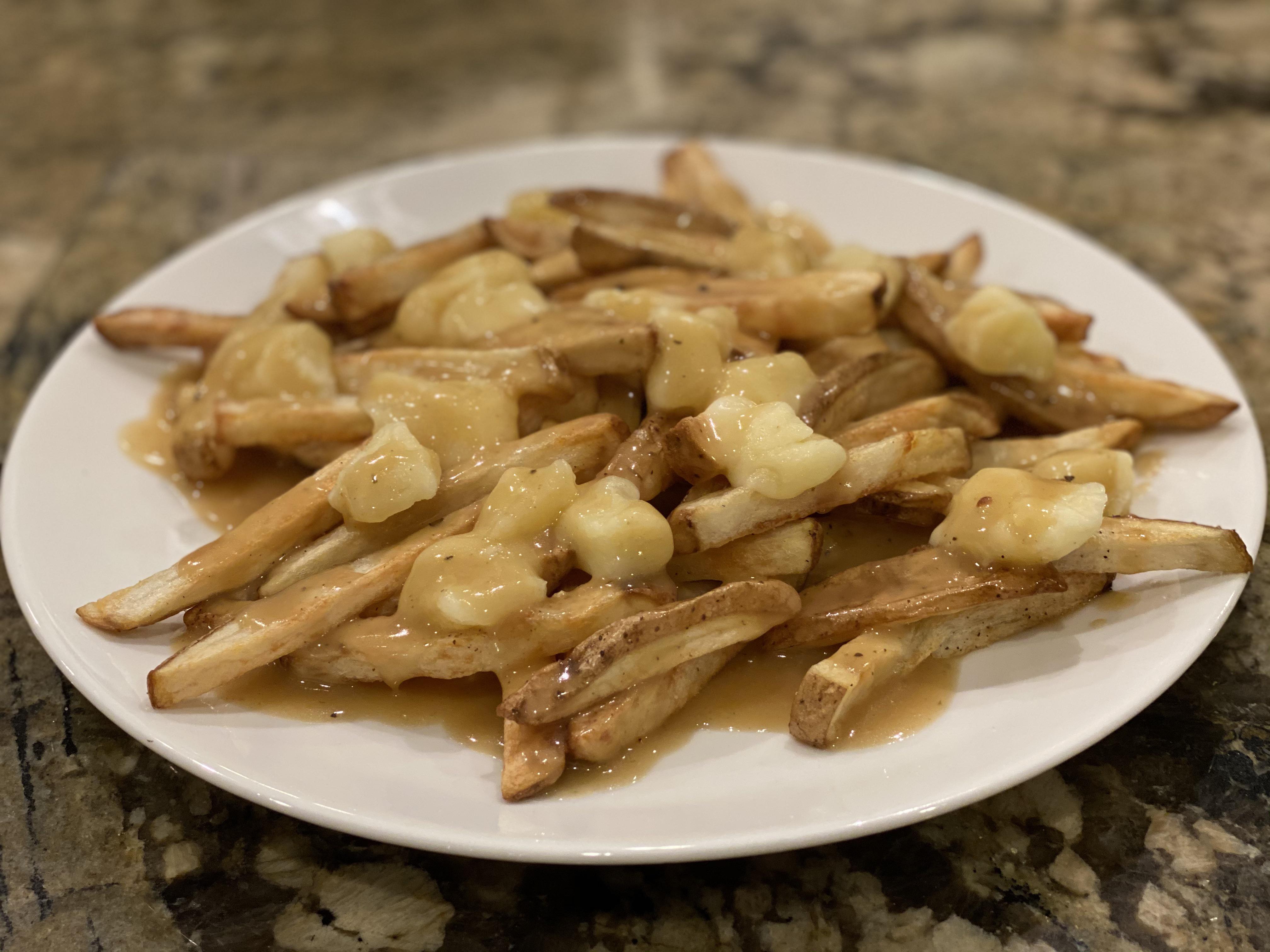 Poutine with Garlic Cheese Curds | Scrolller
