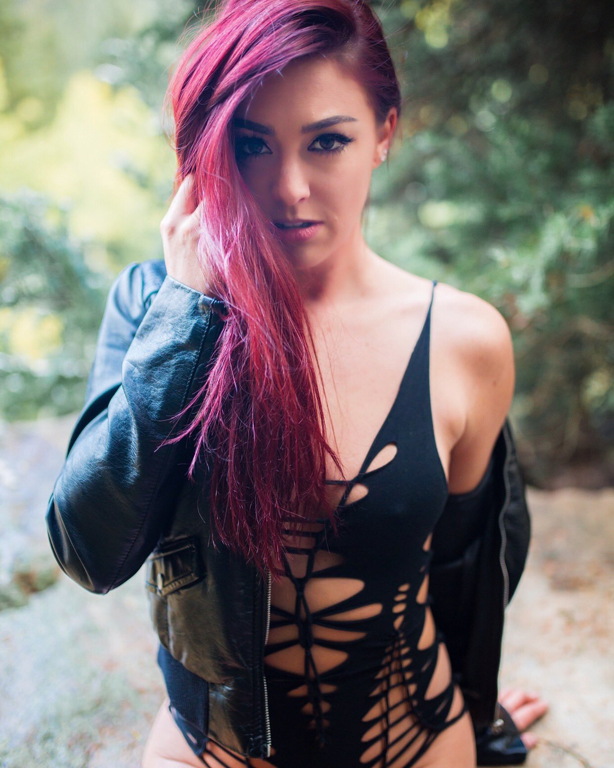 Purple hair. Sexy suit. | Scrolller