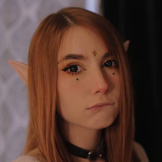 Redhead elf | Scrolller