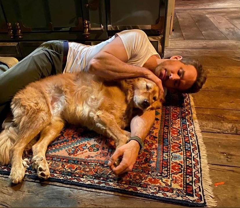 Ryan Reynolds and his good boy Bax. | Scrolller