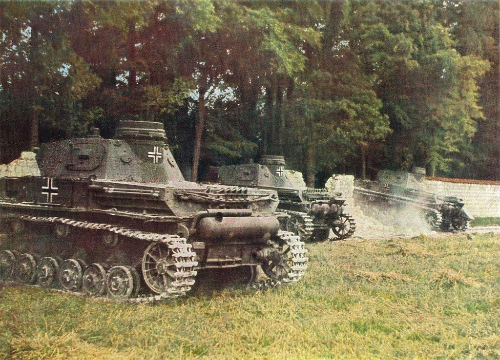 Several Panzer IV crash through a stone wall during the French campaign, May 1940 | Scrolller