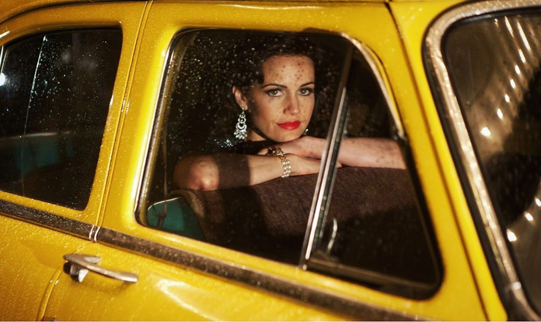 Sexy in a cab on set of Hotel Noir | Scrolller