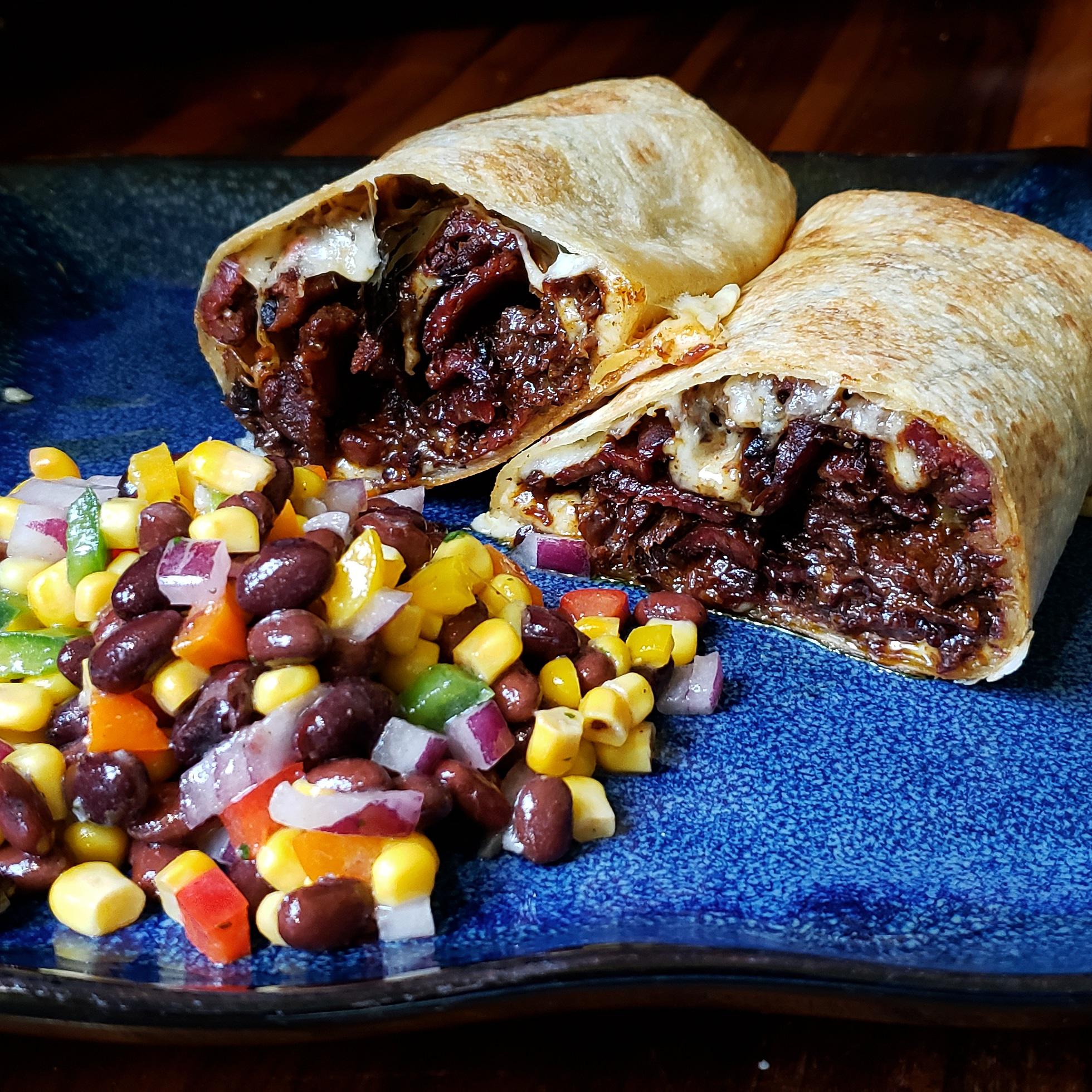 Shaved beef burritos and black bean salad. | Scrolller