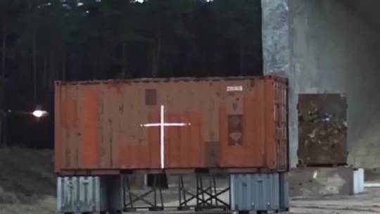 Shipping container meets 120mm high explosive shell | Scrolller