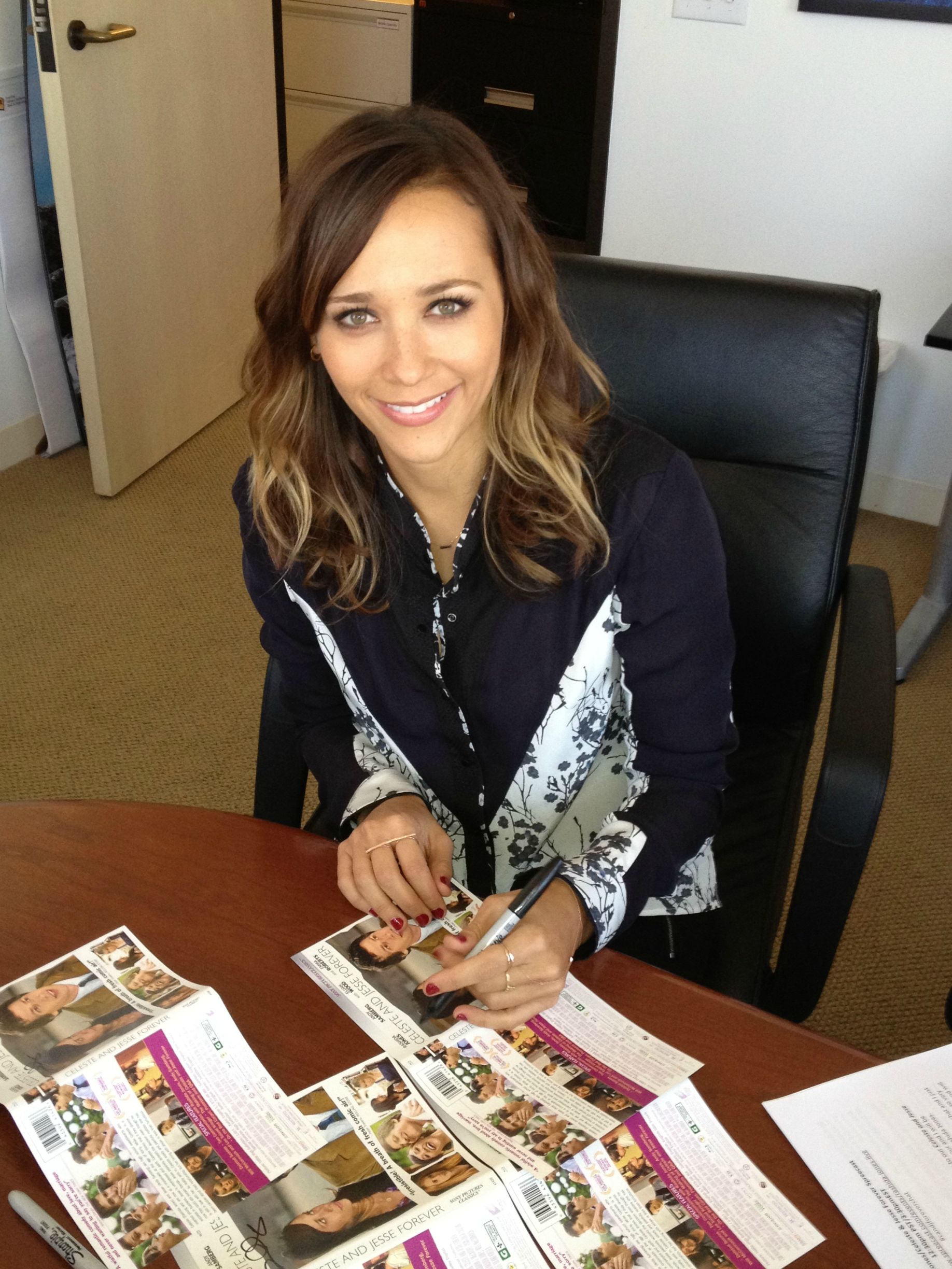 Signing DVDs of her new movie | Scrolller