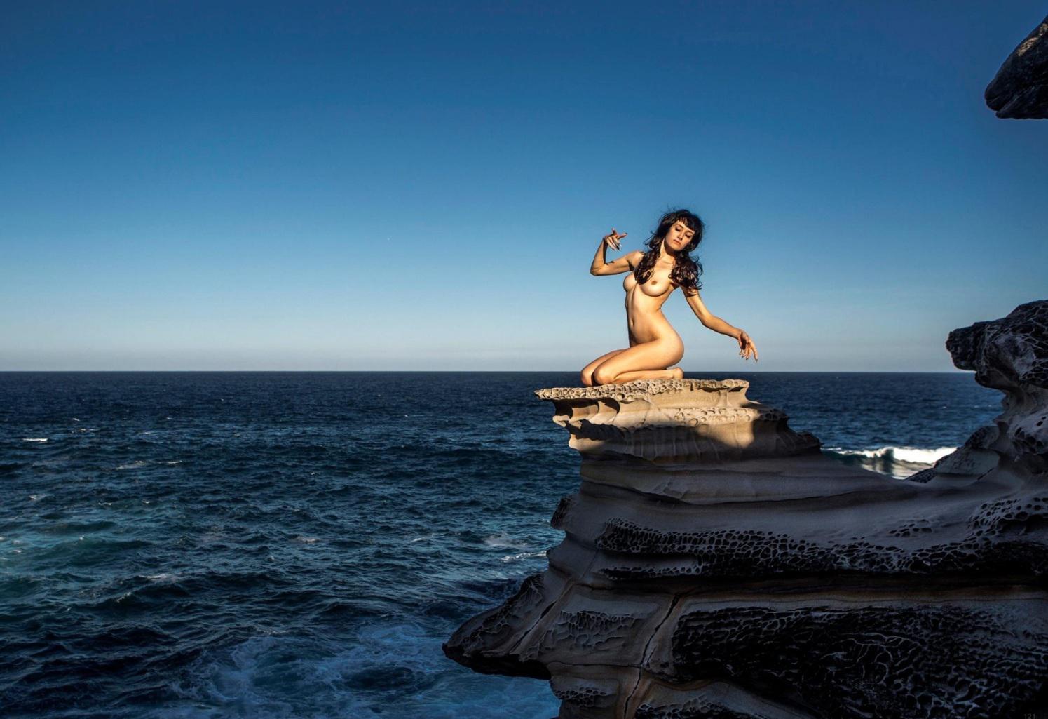 Siren on the rocks | Scrolller