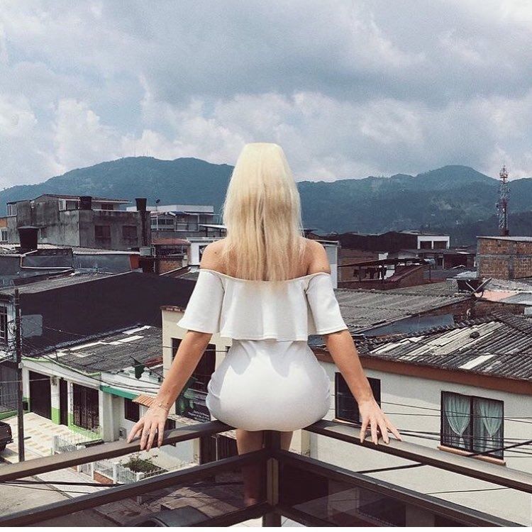 Sitting again, but in white | Scrolller