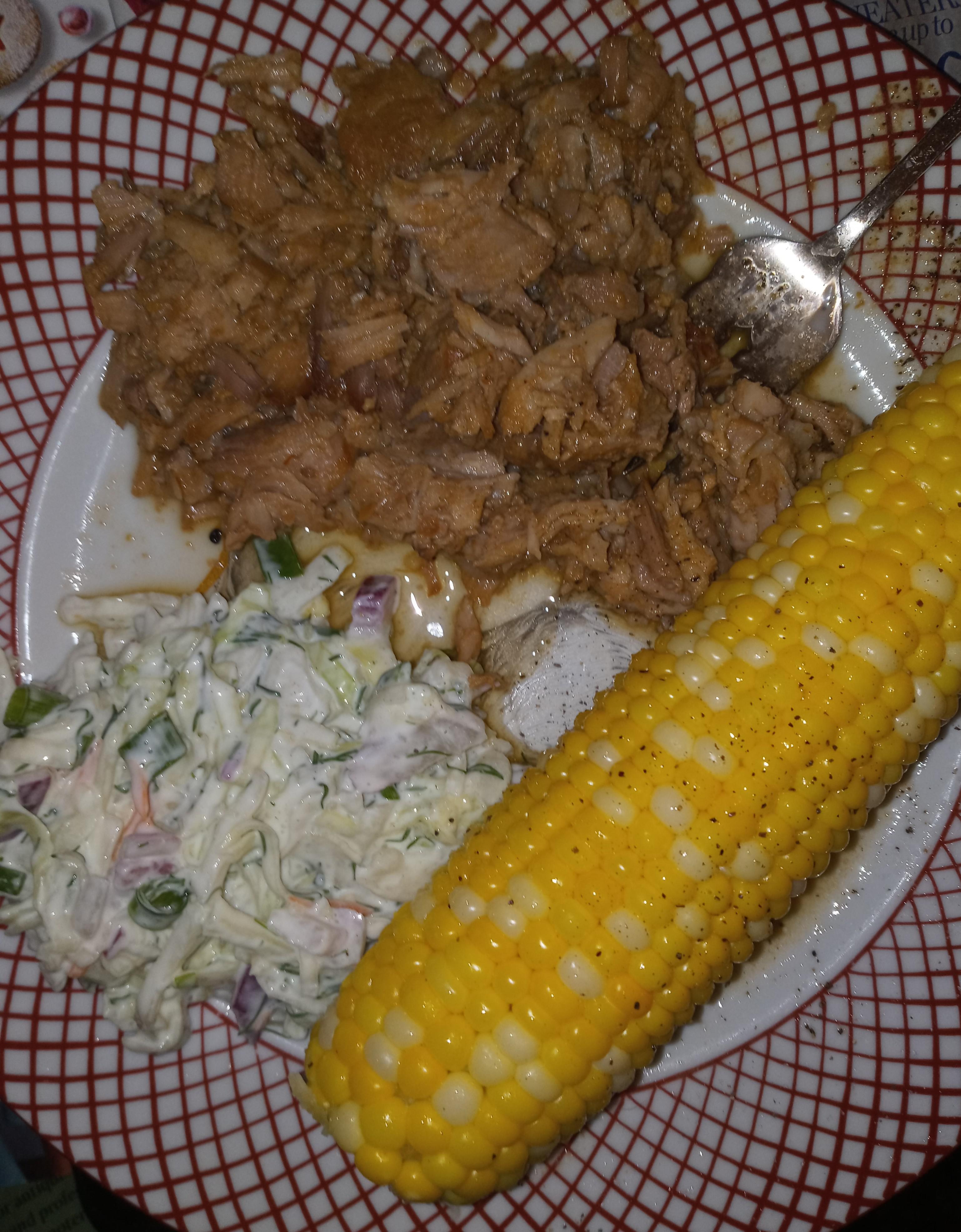 Slow cooked pulled pork with cole slaw and fresh MI sweet corn. | Scrolller