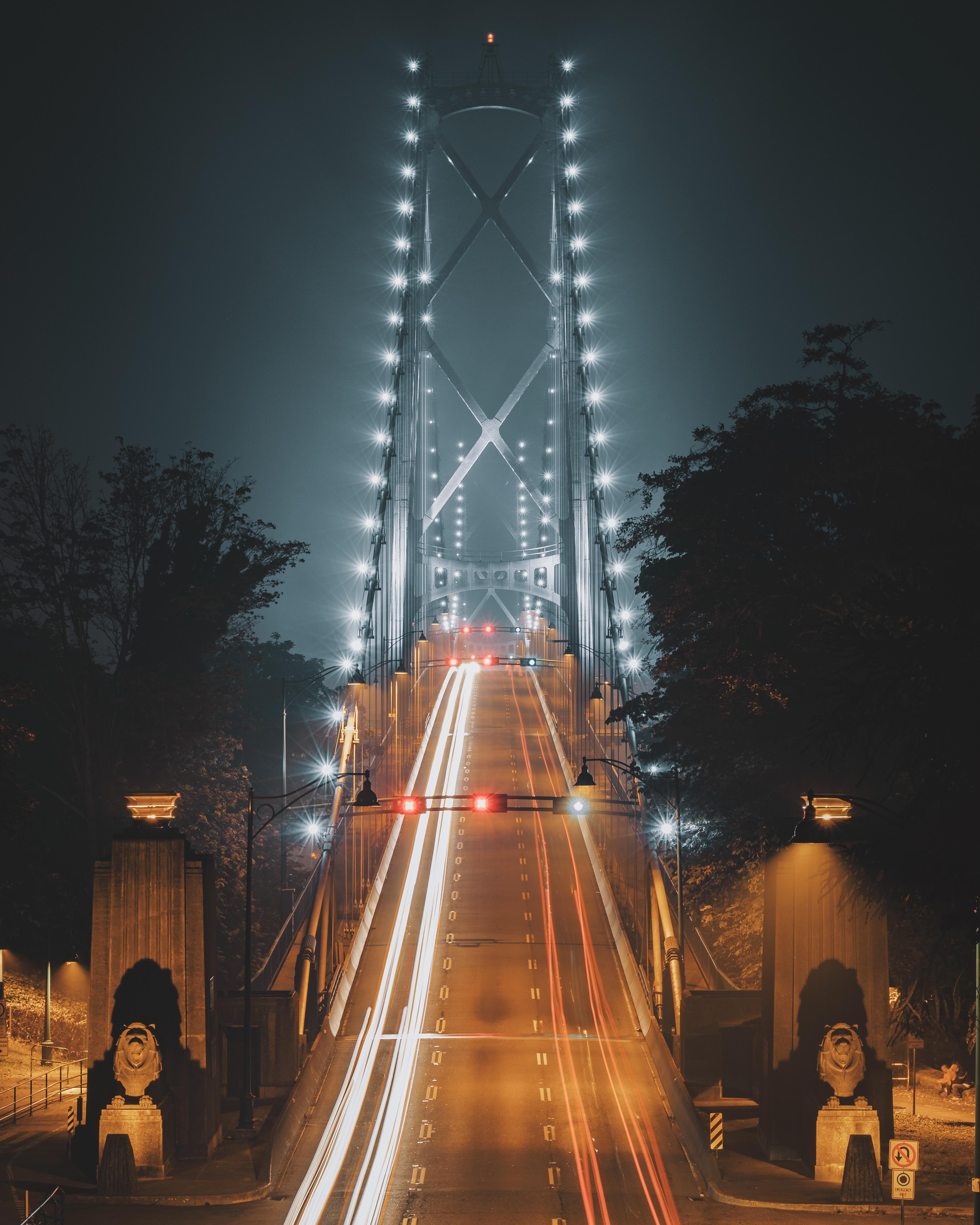 Smokey view of the Lions Gate Bridge at night | Scrolller
