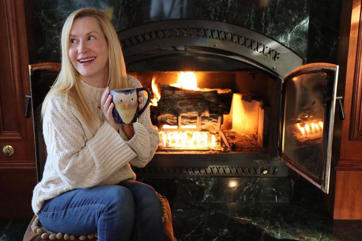 Staying cozy by the fire. | Scrolller