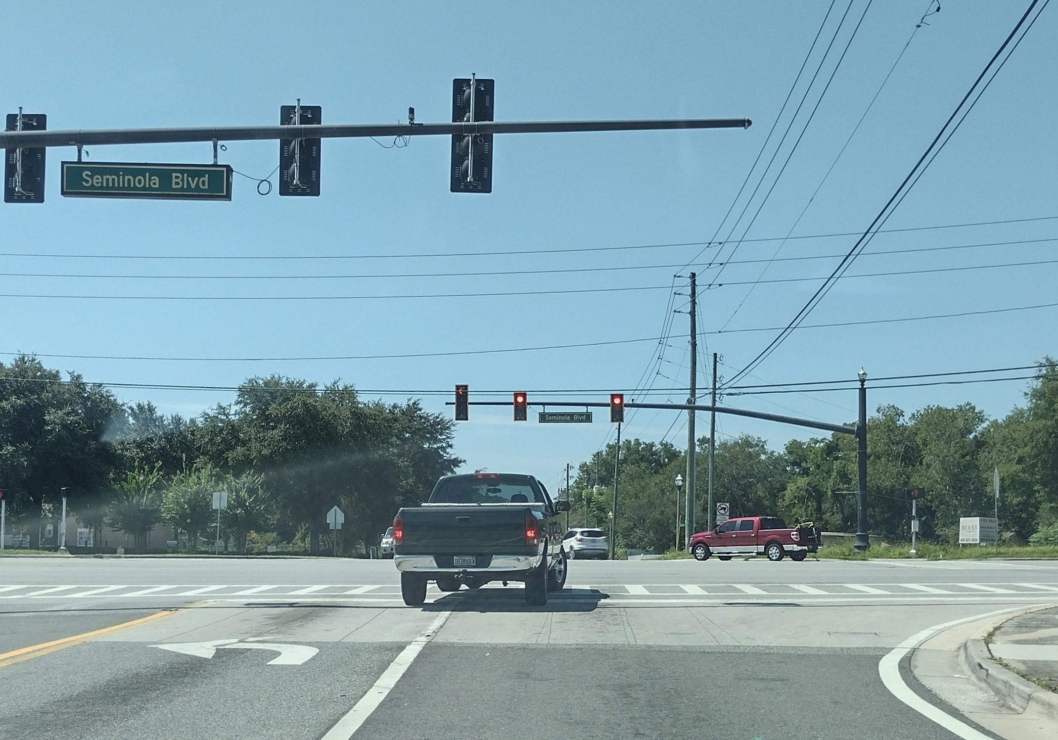 Straddling the crosswalk and 2 lanes. | Scrolller