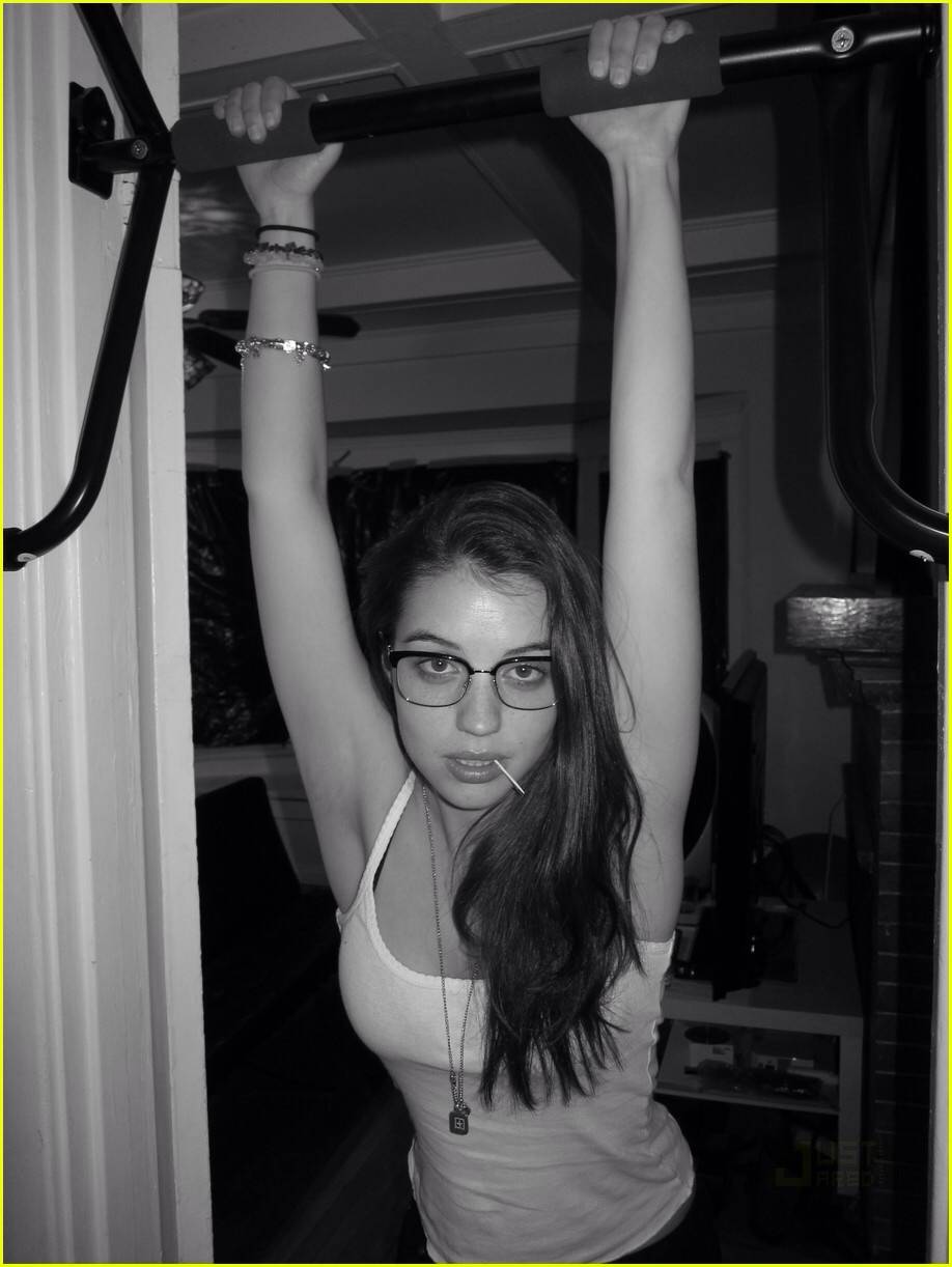 Stretching by a pull-up bar | Scrolller