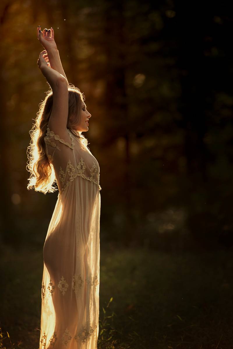 Stretching in the Setting Sun | Scrolller