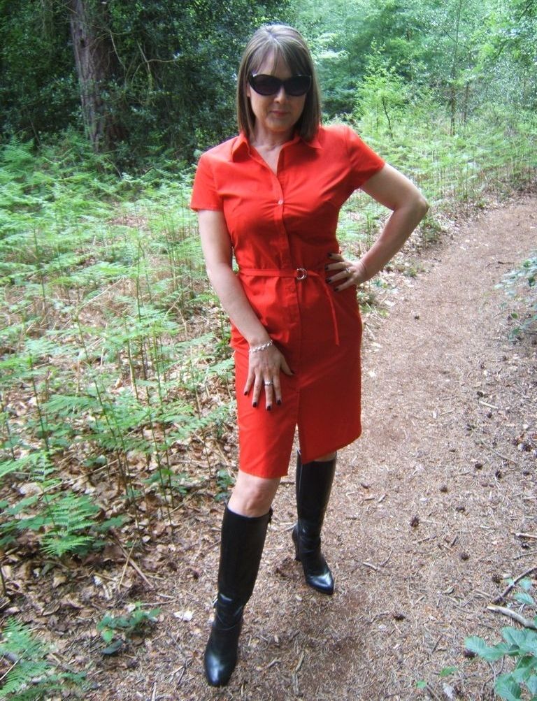 Stripping out of her red dress part 1 | Scrolller