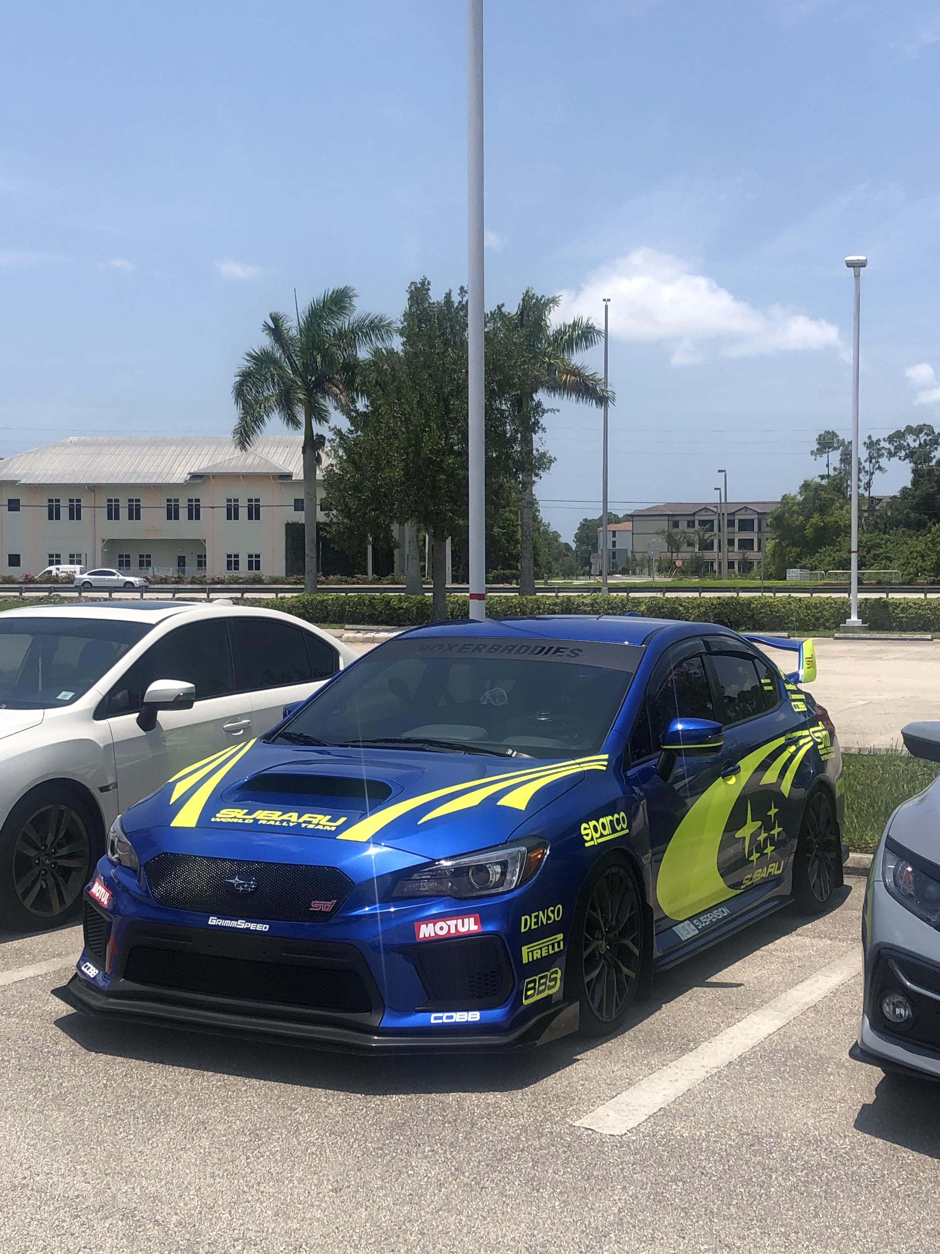 [Subaru WRX STI] Subaru rally livery in a parking lot | Scrolller
