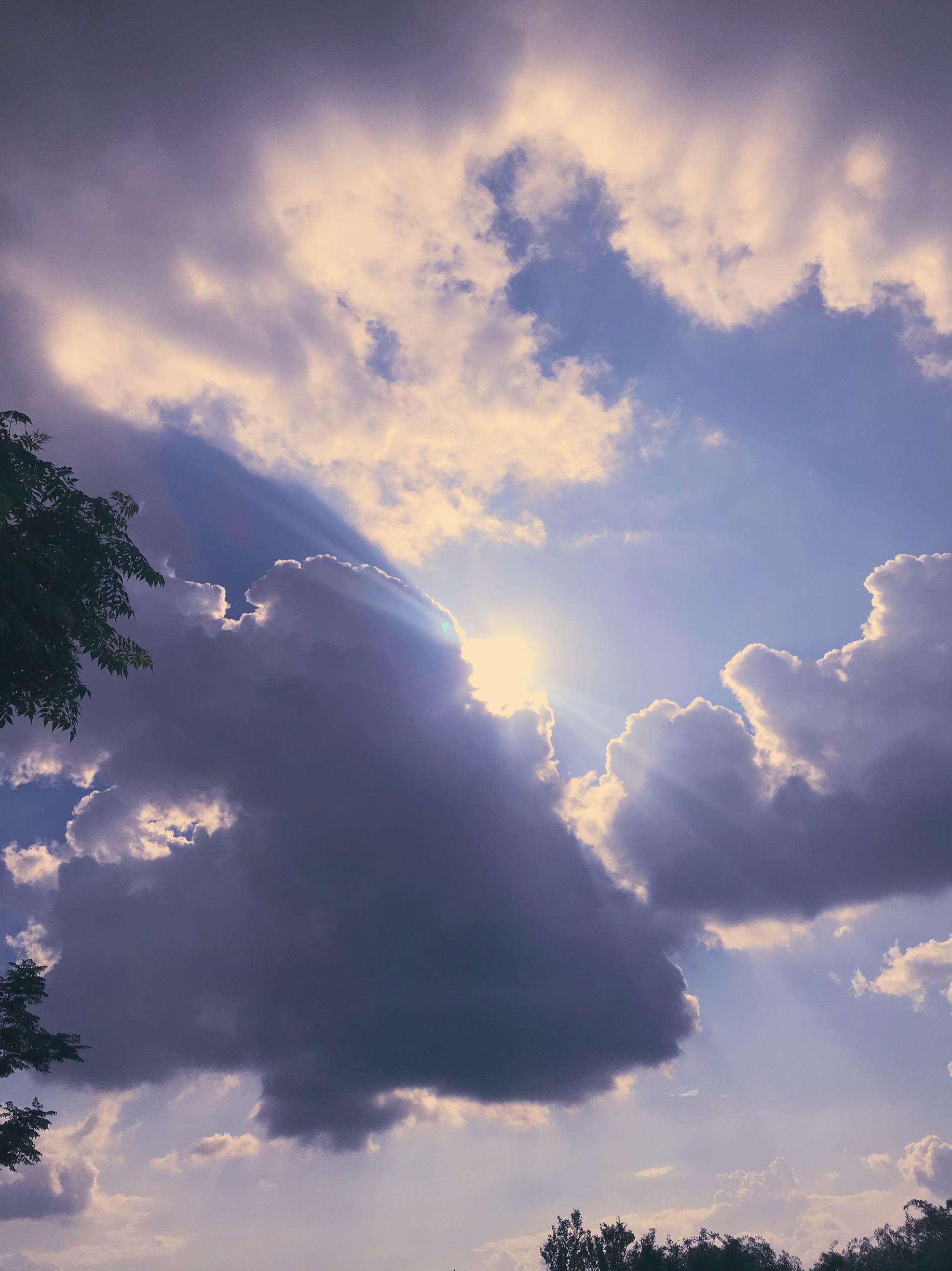 Sun and clouds. | Scrolller