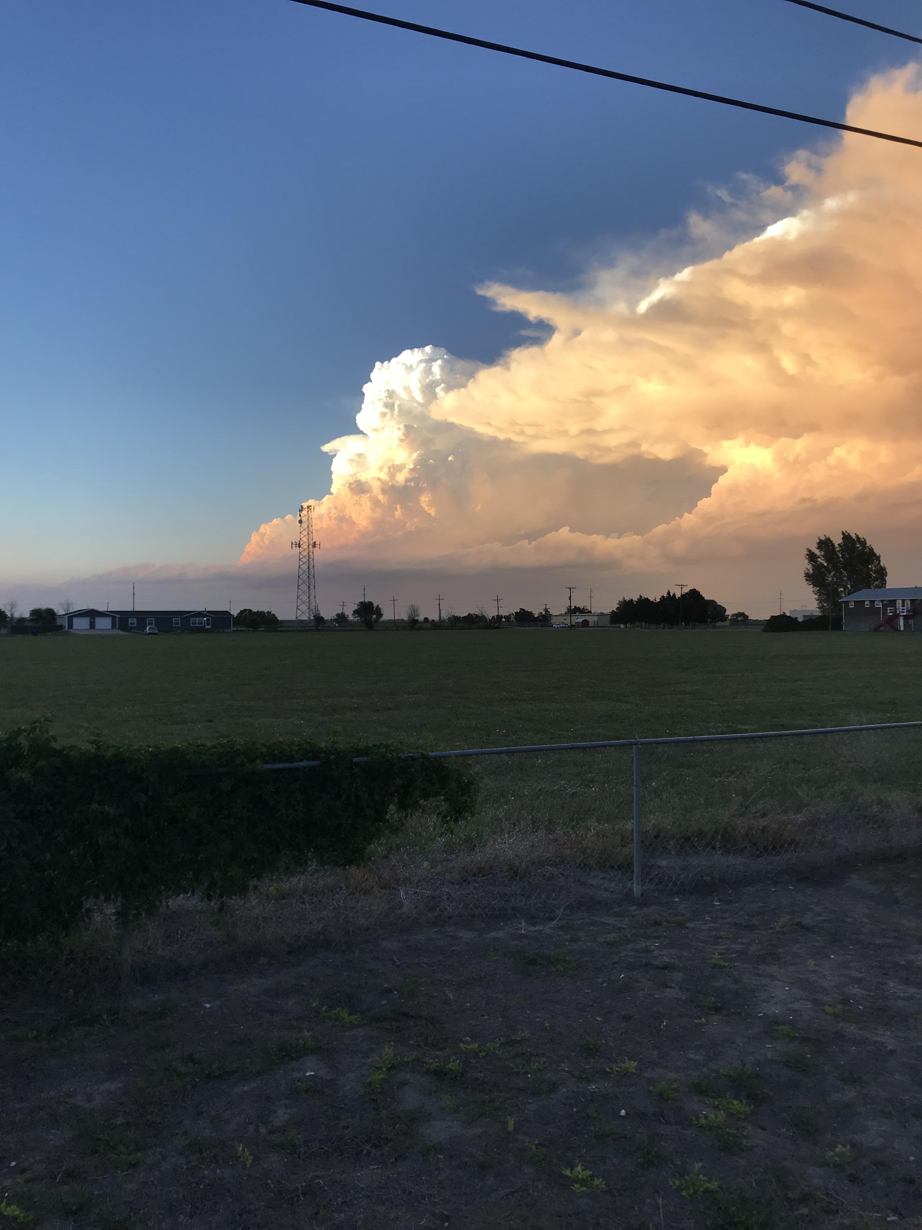 Sunset on thunderstorm Colorado plains | Scrolller
