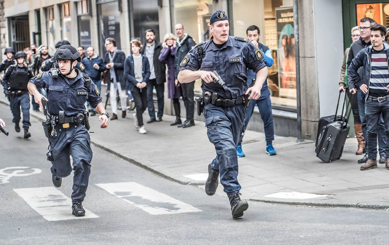 Swedish police officers running into action. [1240x782] | Scrolller