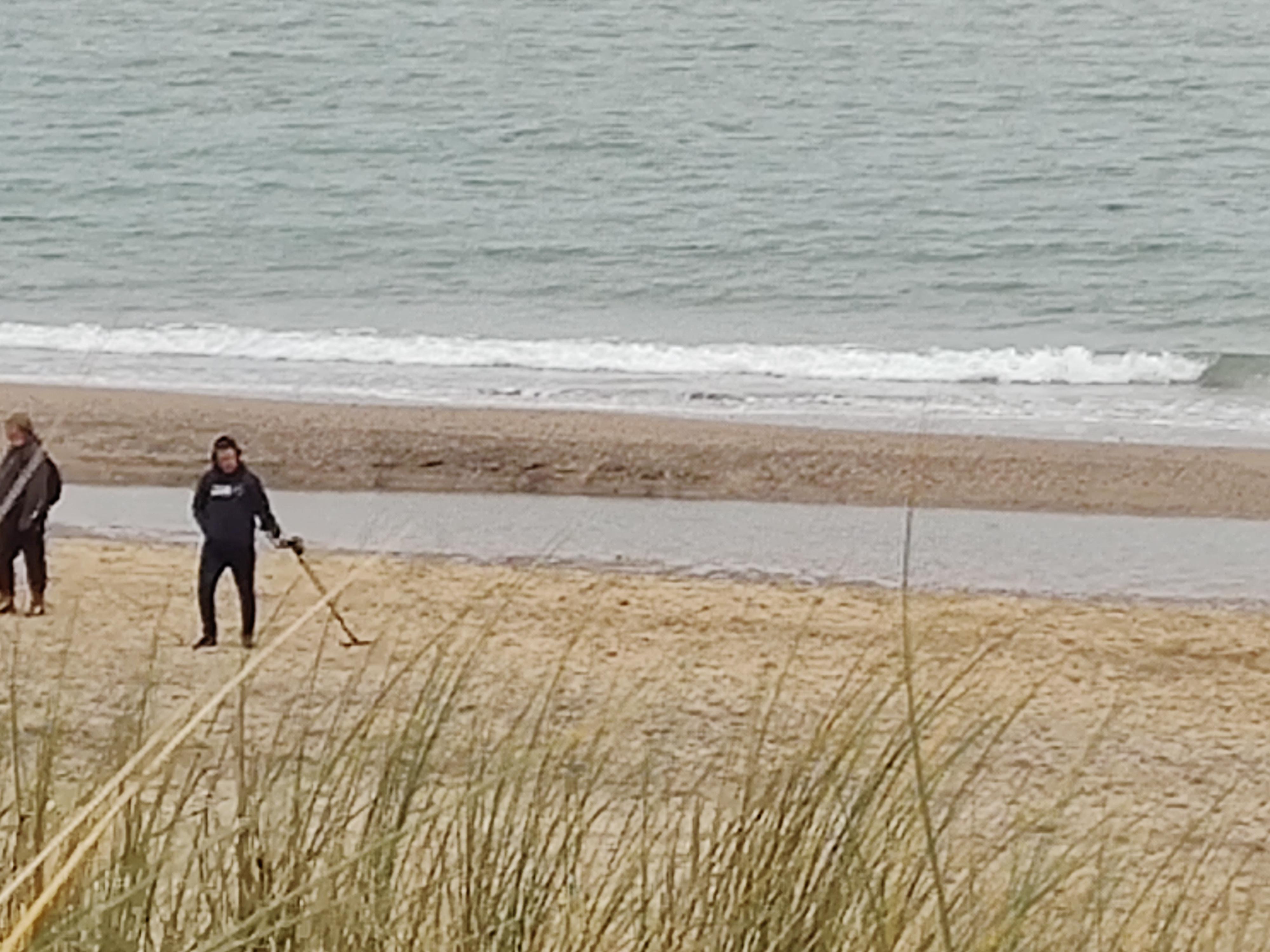 "That's me on the beachside combing the sand, Metal meter in my hand" | Scrolller
