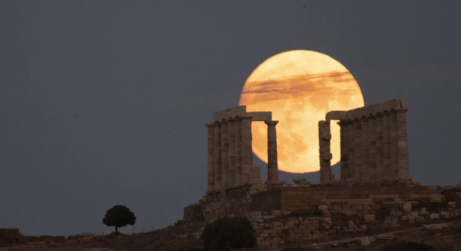 The ancient Greek temple of Poseidon at Cape Sounion in Greece | Scrolller