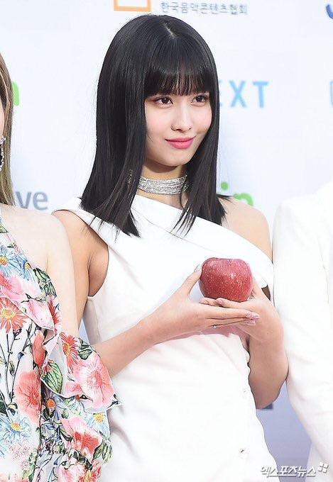 the look that Momo gives while holding her apple | Scrolller