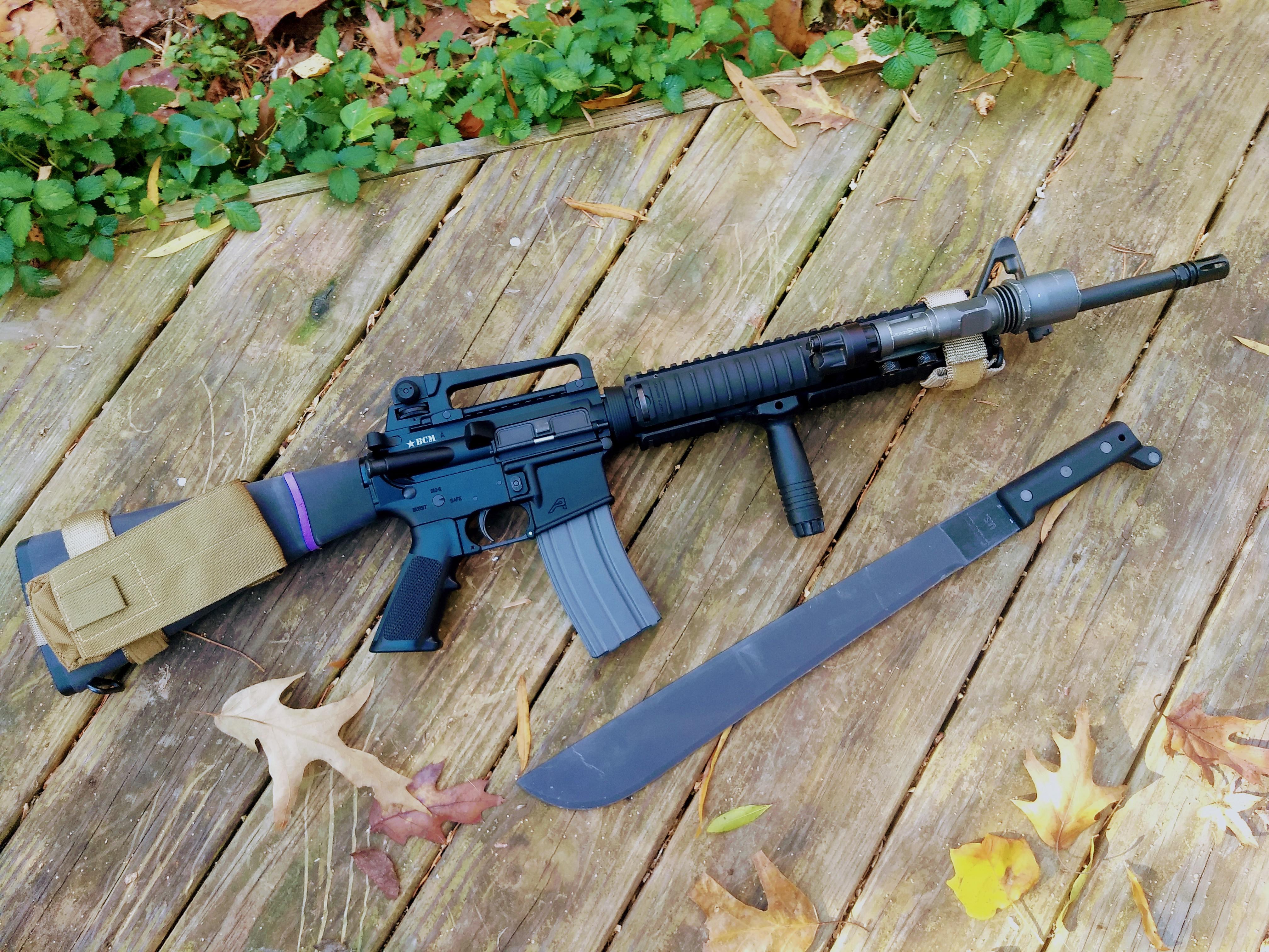 The M16A4 and a machete for scale. | Scrolller