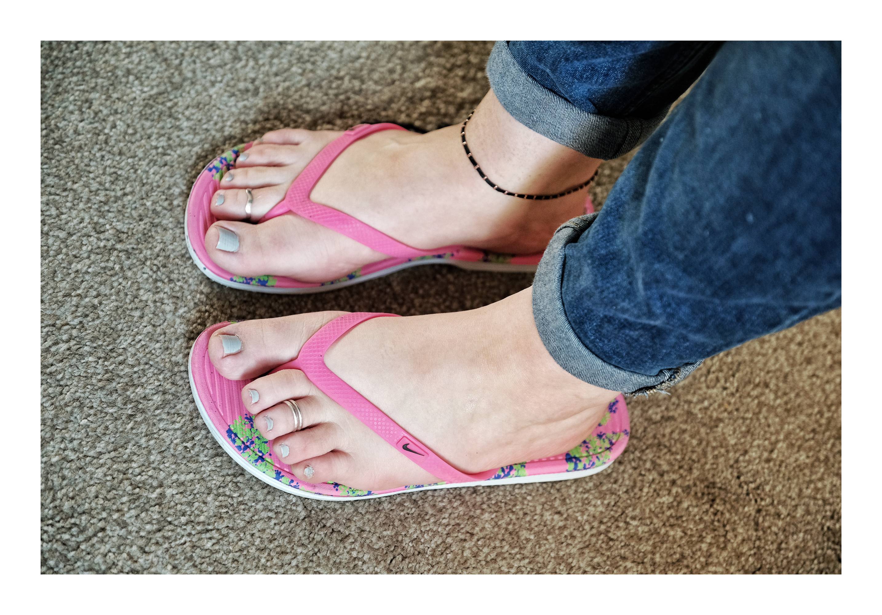 The wife’s little feet in her tiny flippies. | Scrolller