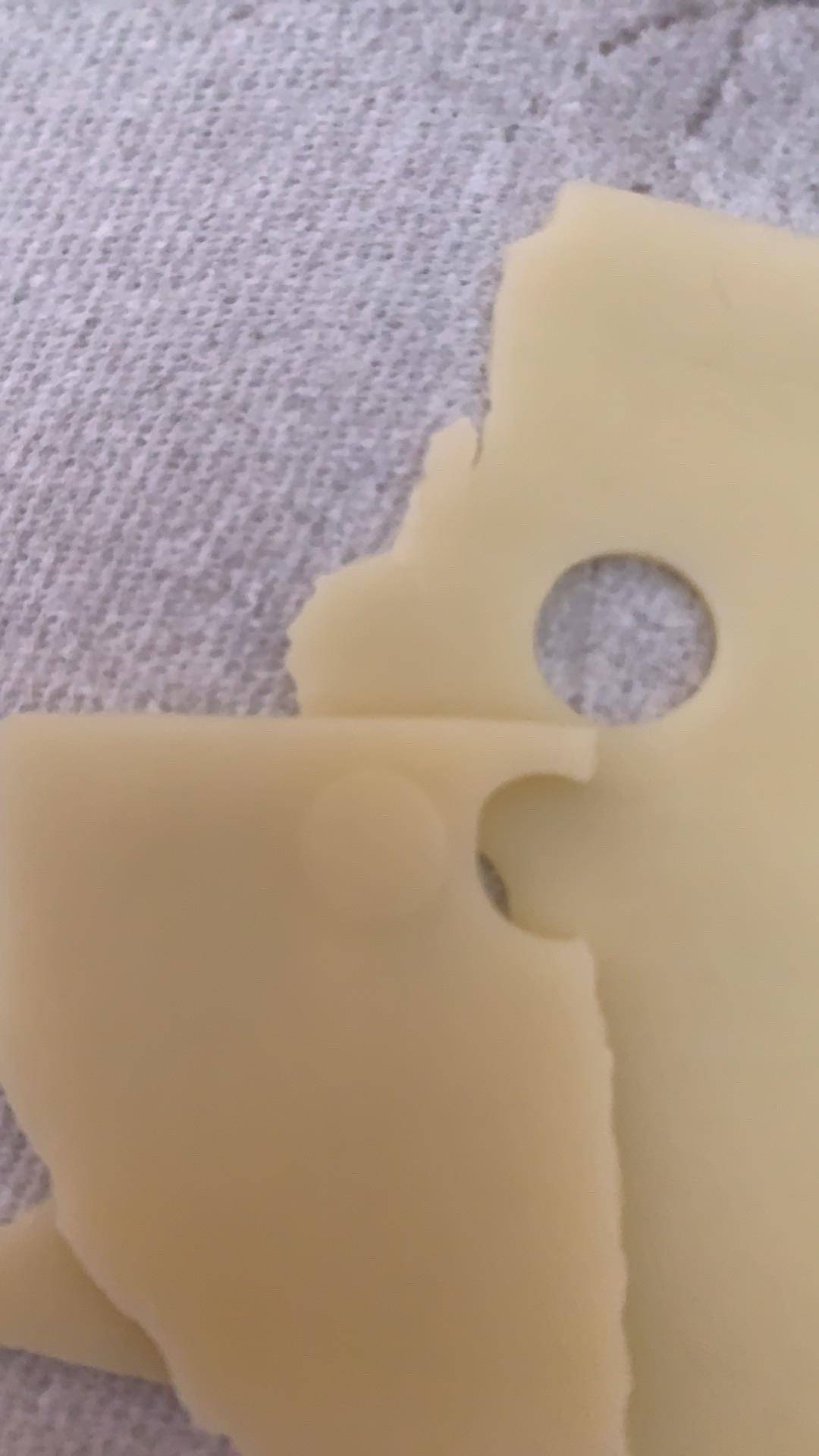 They manually punch holes in the Swiss cheese at my grocery store. | Scrolller
