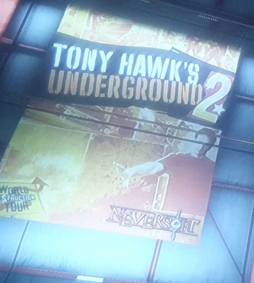 This poster appears on the new Tony Hawk game. Bam margera has been cut out from it. | Scrolller