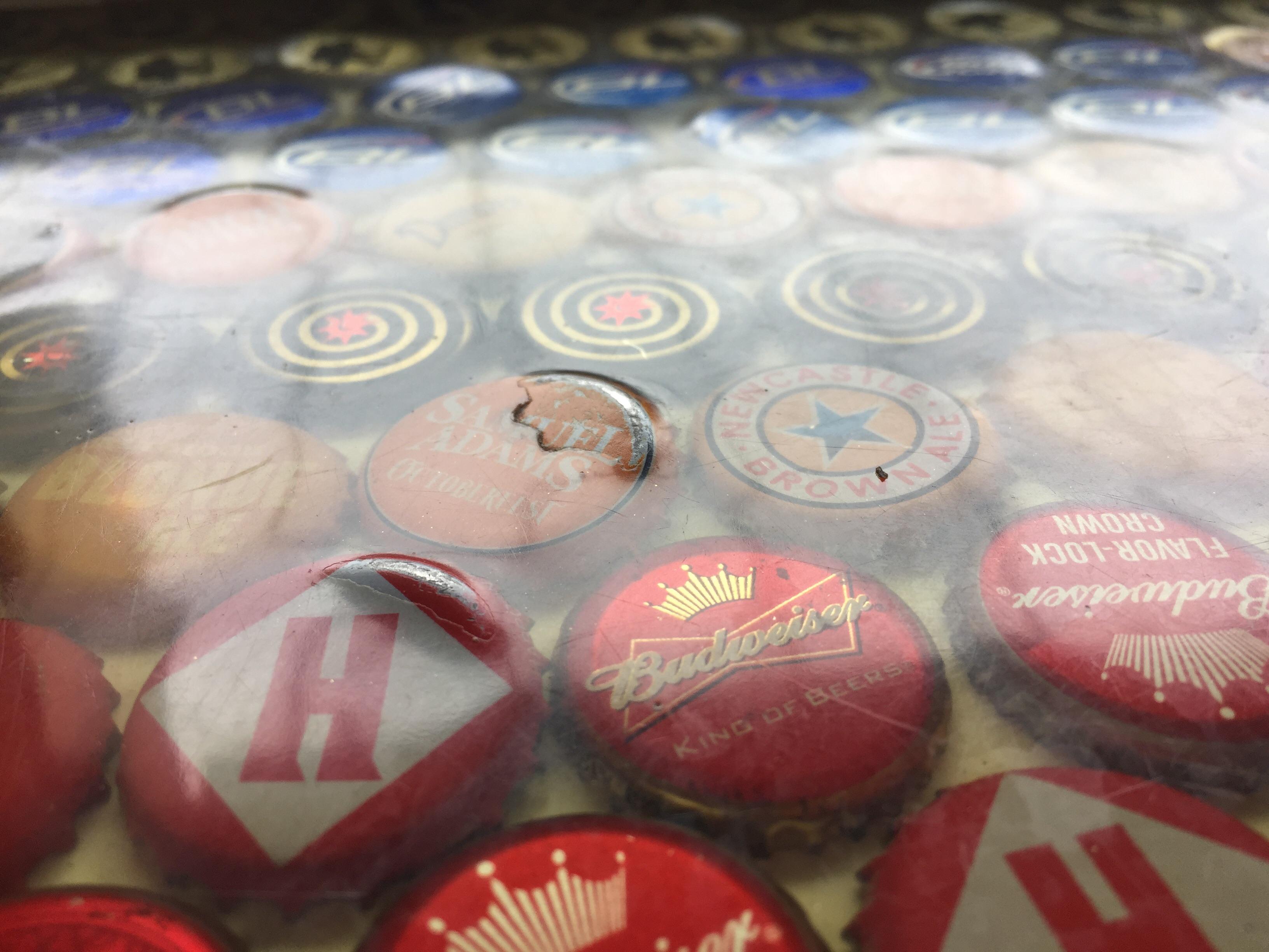 This uneven bottle cap table top | Scrolller