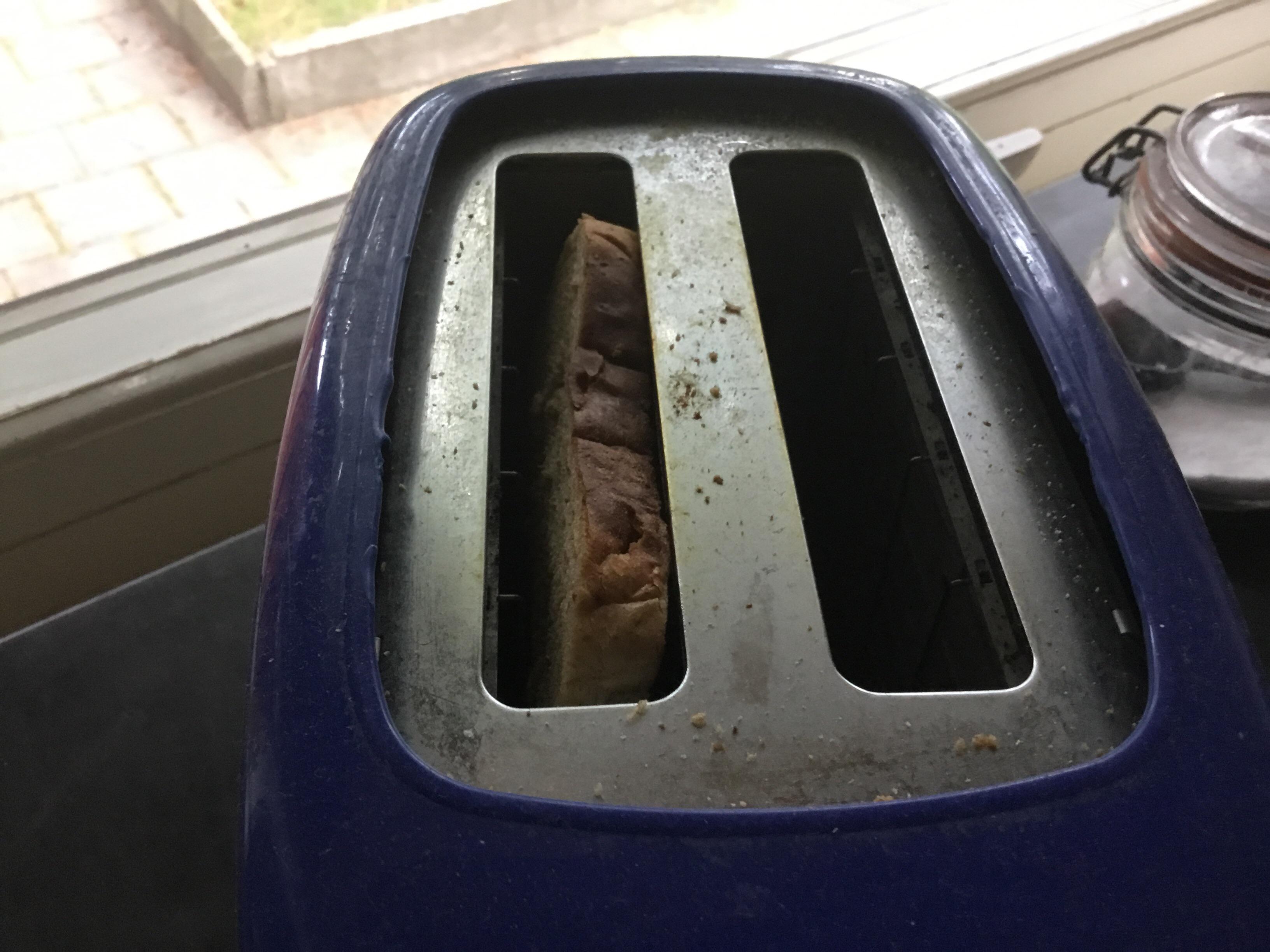 Toaster failed to eject bread slice | Scrolller