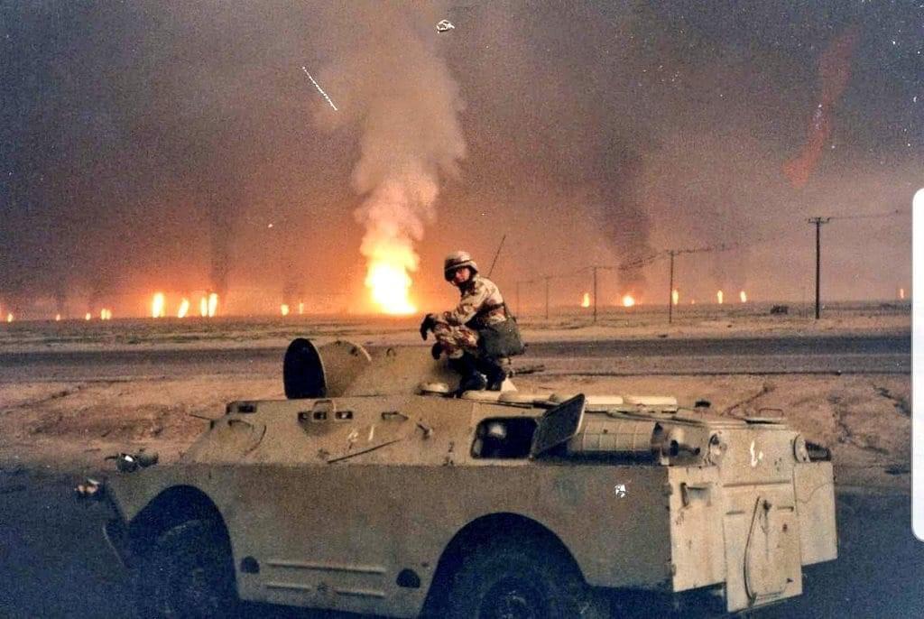 U.S. Soldier on a Soviet-Made BDRM in front of burning oil wells, Kuwait, 1991 [1024x686 ...