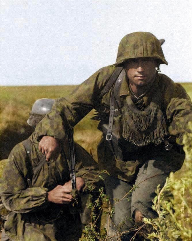 Waffen SS grenadiers on the move during Operation Citadel. | Scrolller