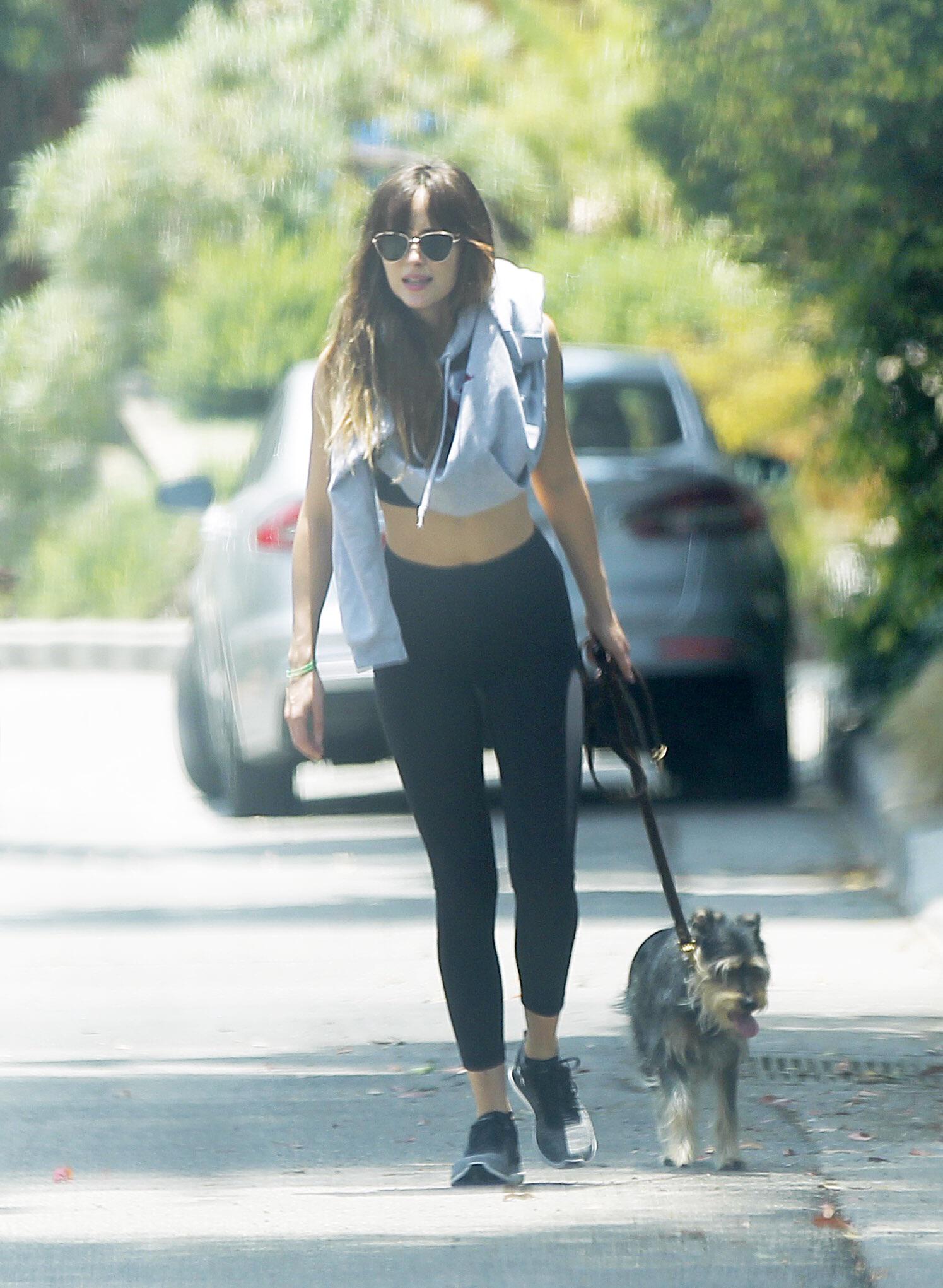 Walking her dog | Scrolller