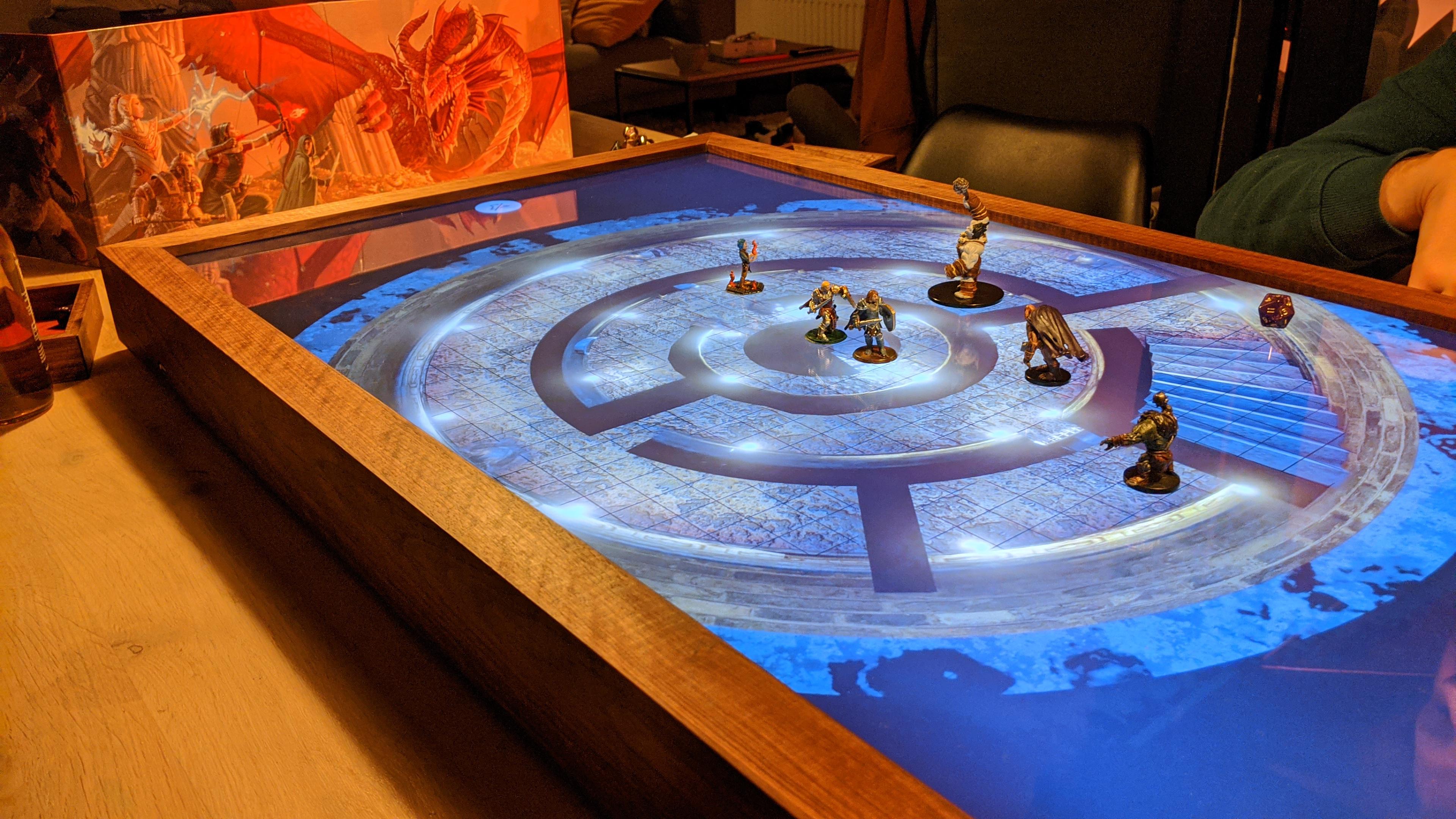 We finally finished our version of a DnD table! Complete with charging ports for phones/tablets ...