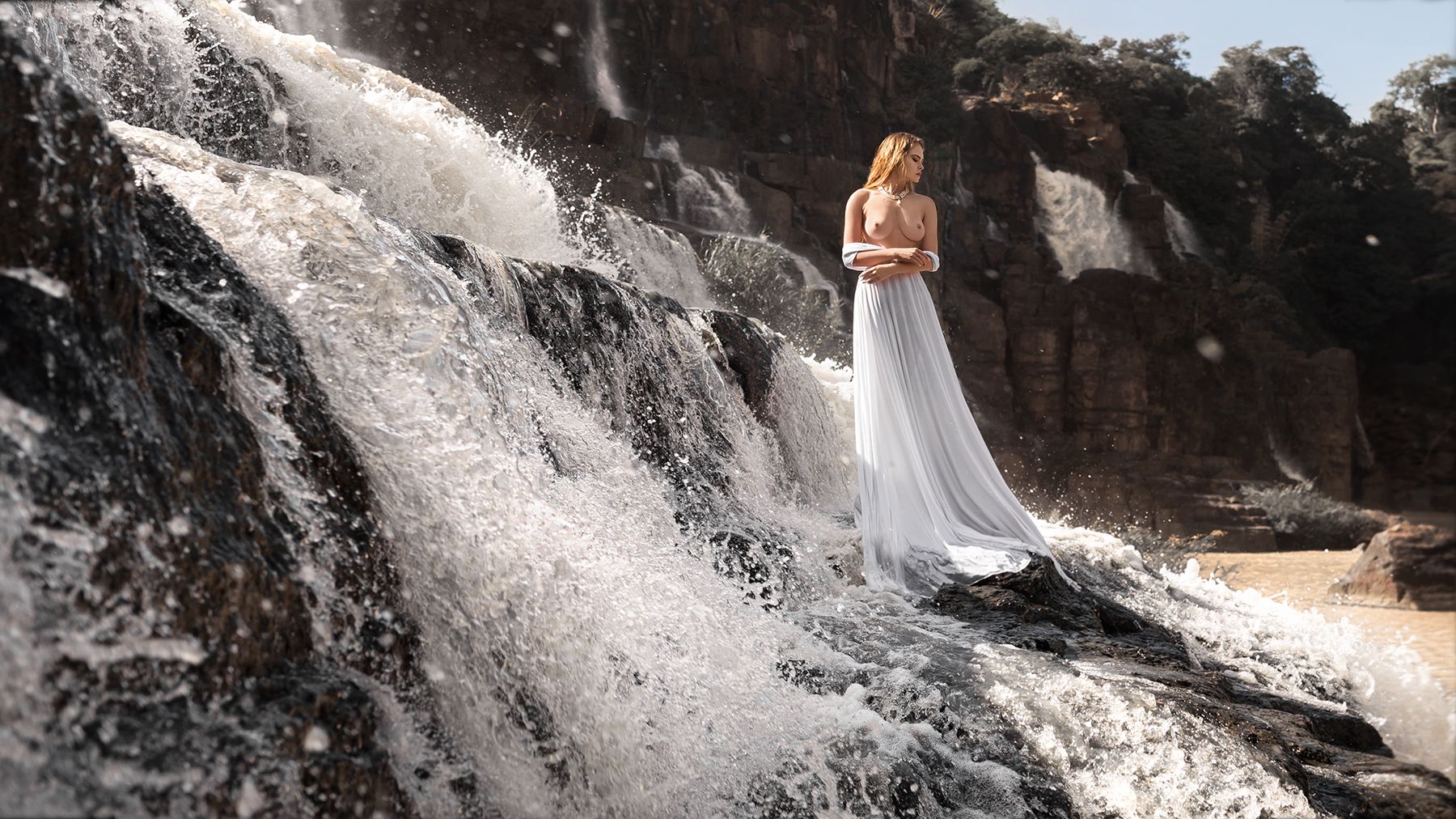White Dress at a Waterfall | Scrolller