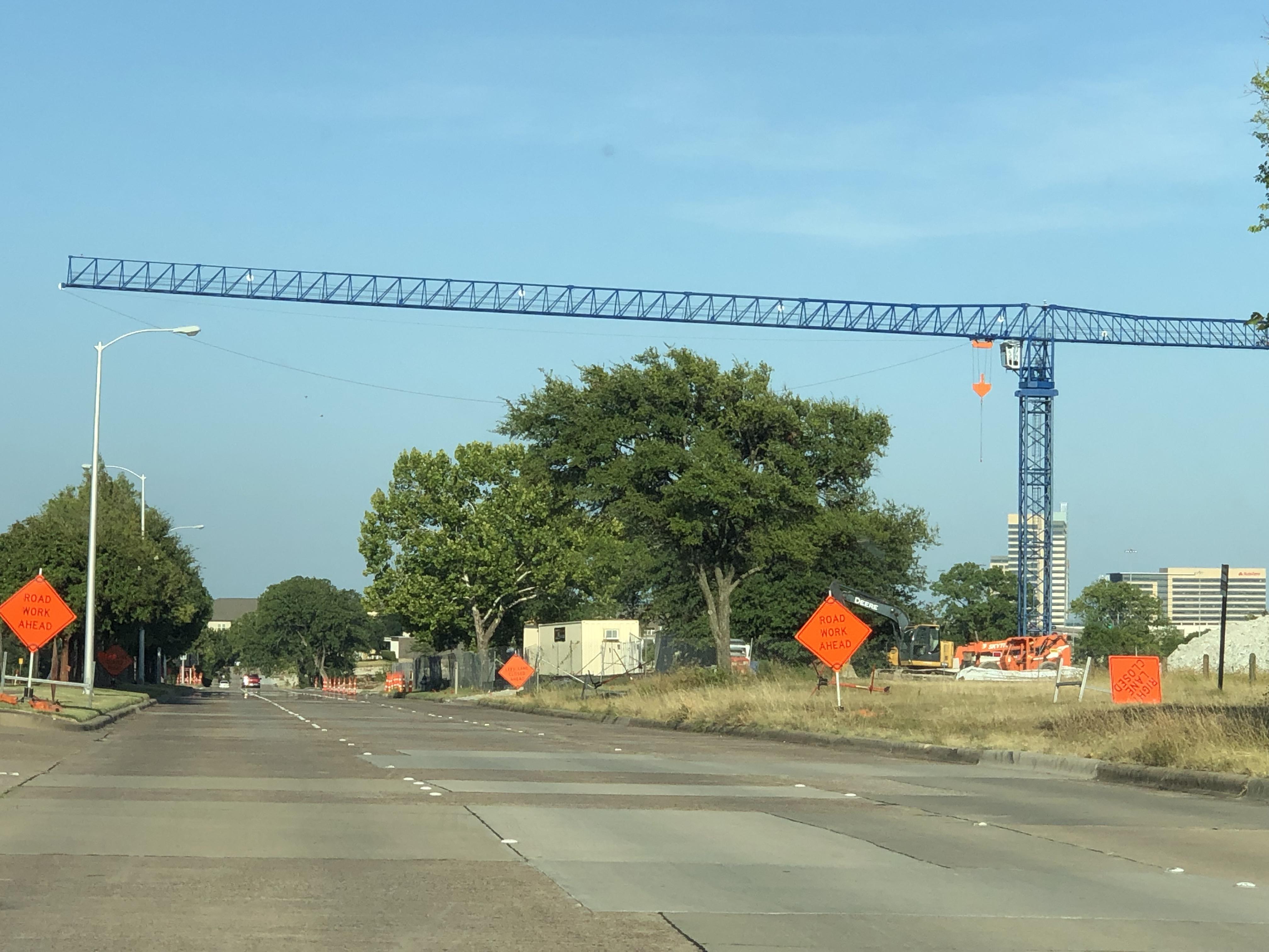 Why would you park the tower crane over the road instead of the empty construction site behind ...